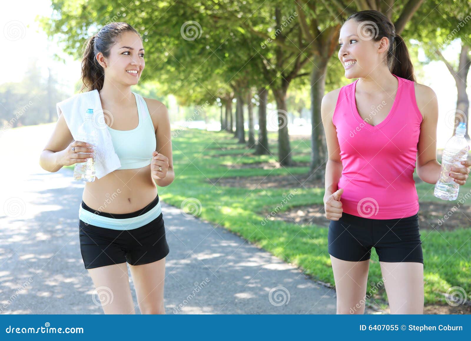 Pretty Sisters Jogging in Park Stock Image - Image of couple, outdoor ...