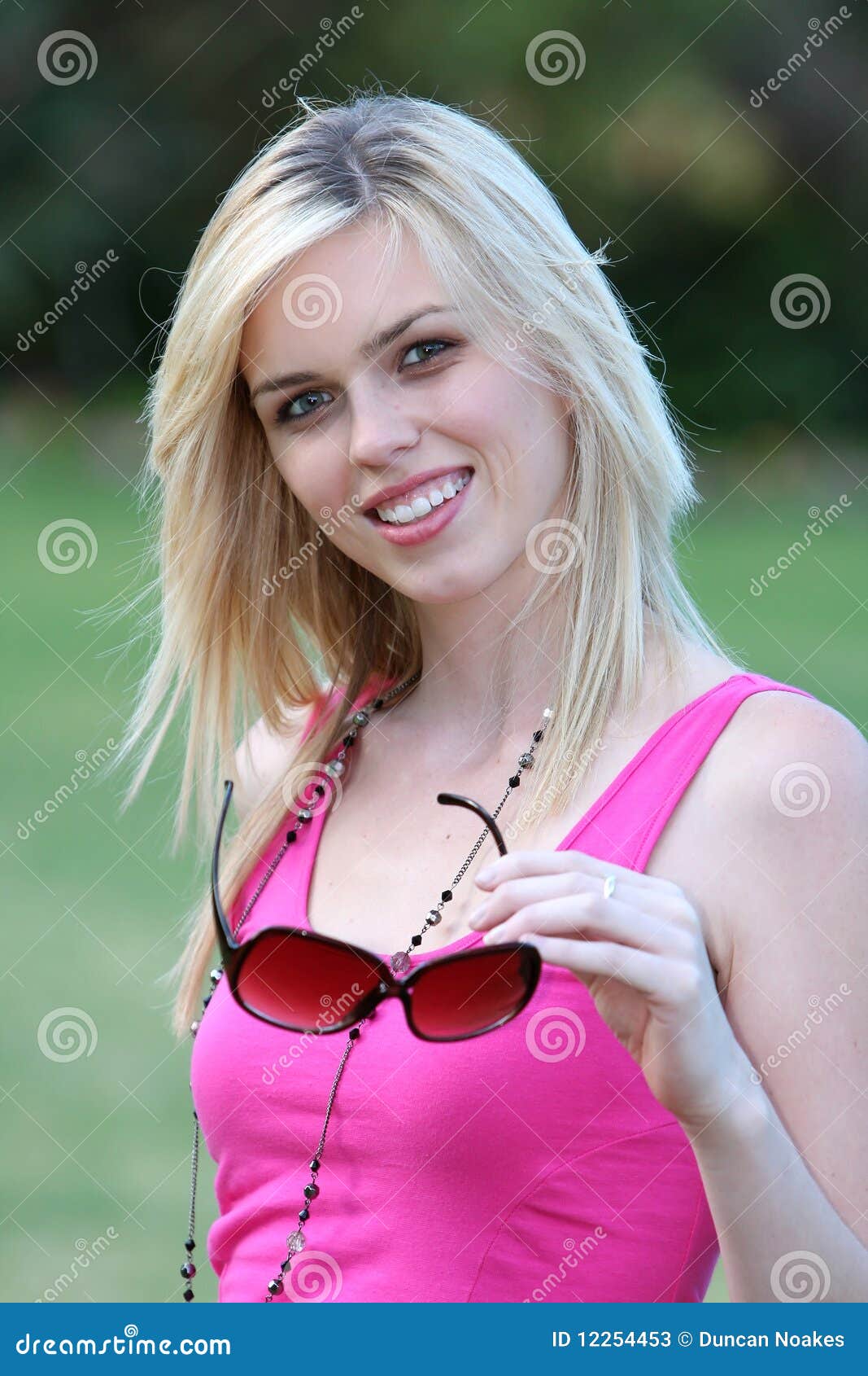 Pretty Smiling Blond Girl stock image. Image of glasses - 12254453