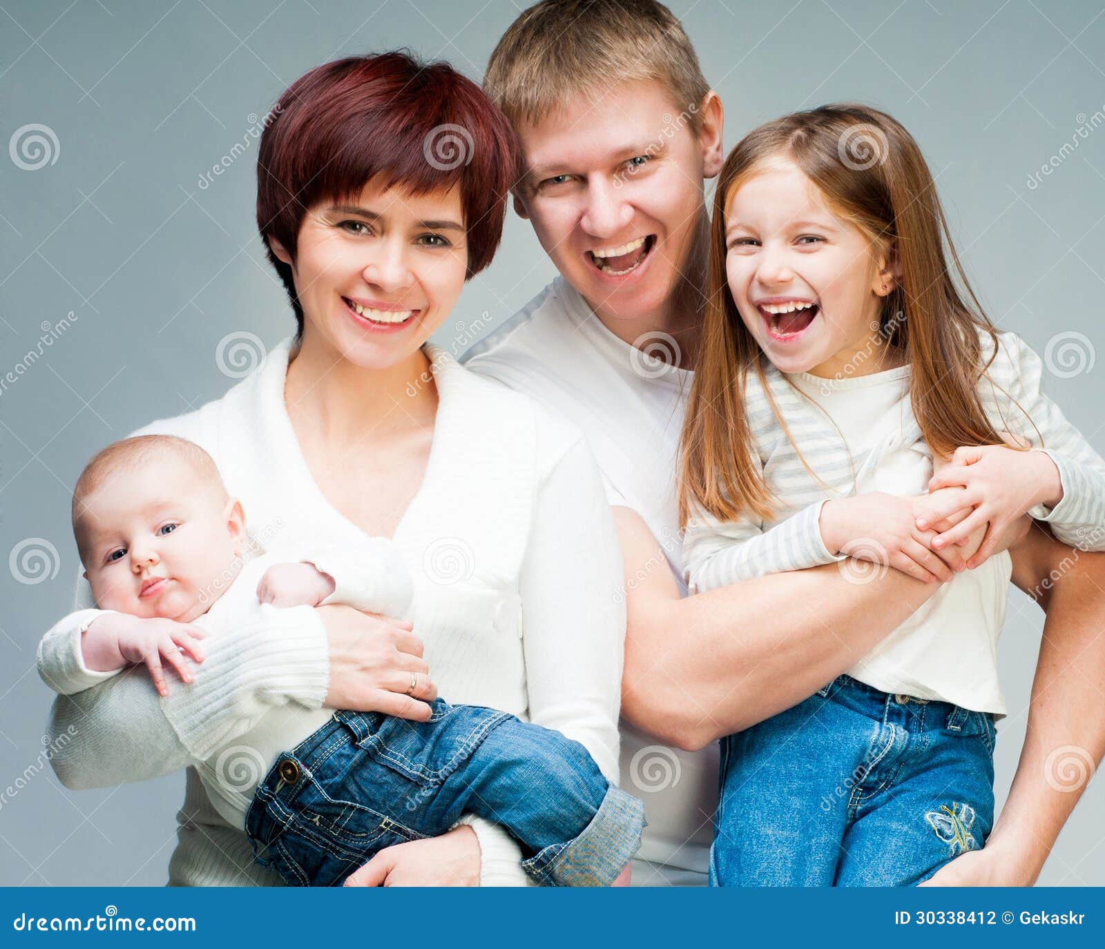 Pretty smiling family stock photo. Image of father, family - 30338412