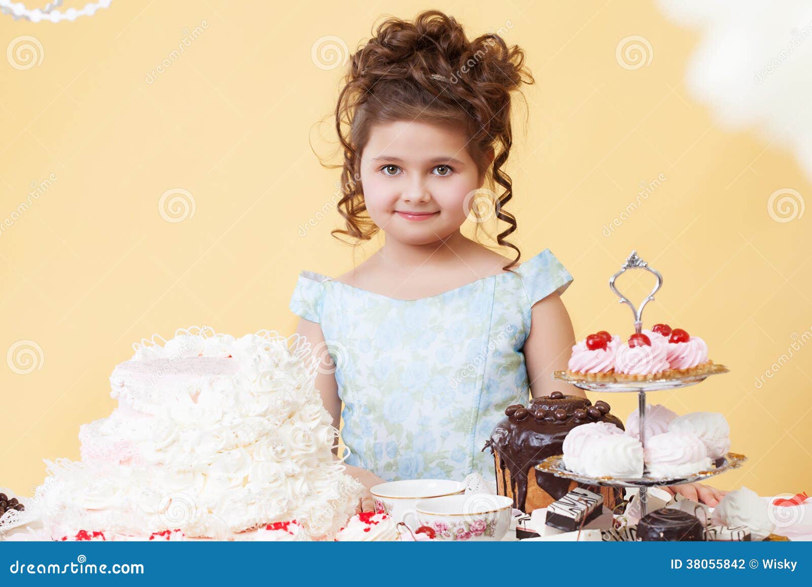 Pretty Smiling Girl Posing at Table with Desserts Stock Photo - Image ...