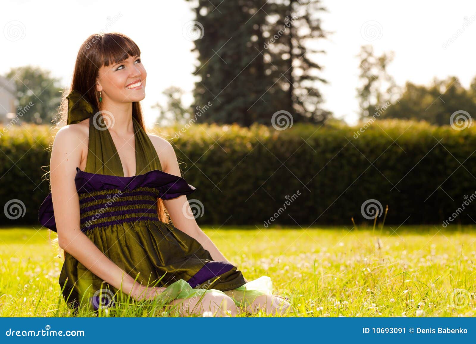 Pretty Smiling Girl is Sitting on the Grass Stock Image - Image of ...