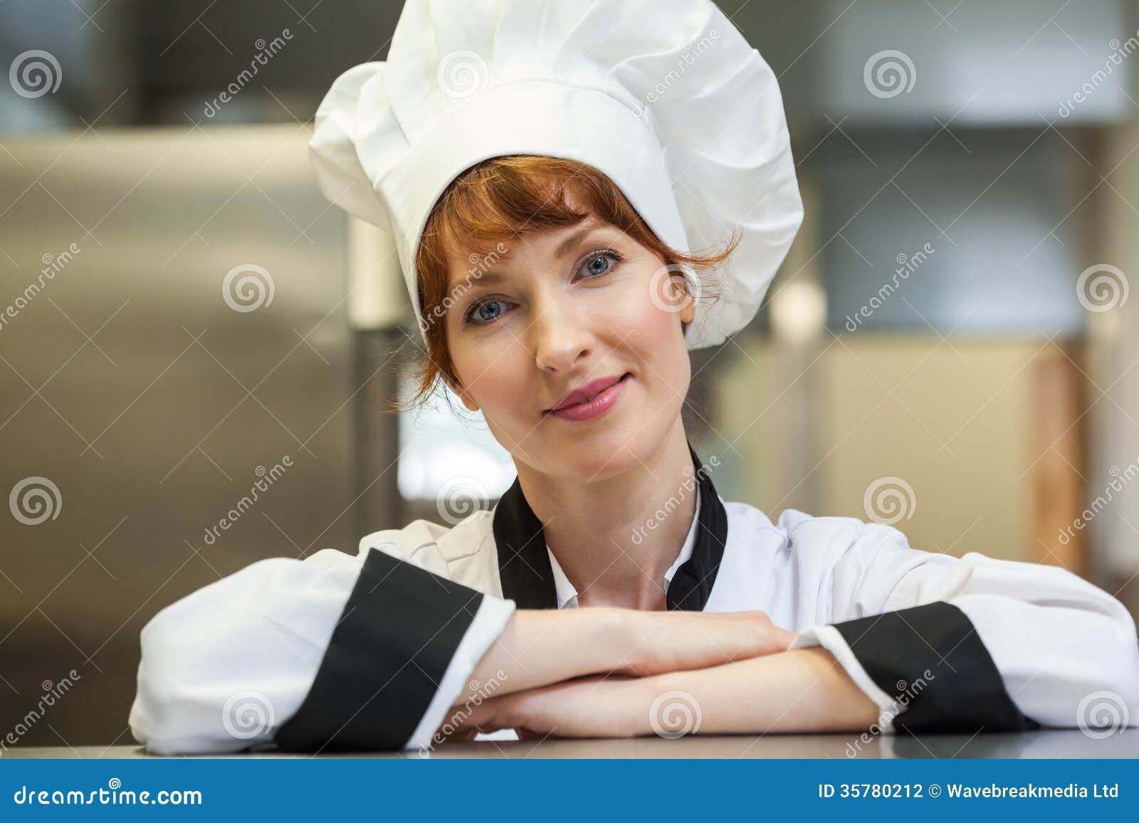 Pretty Smiling Head Chef Looking at Camera Stock Photo - Image of ...