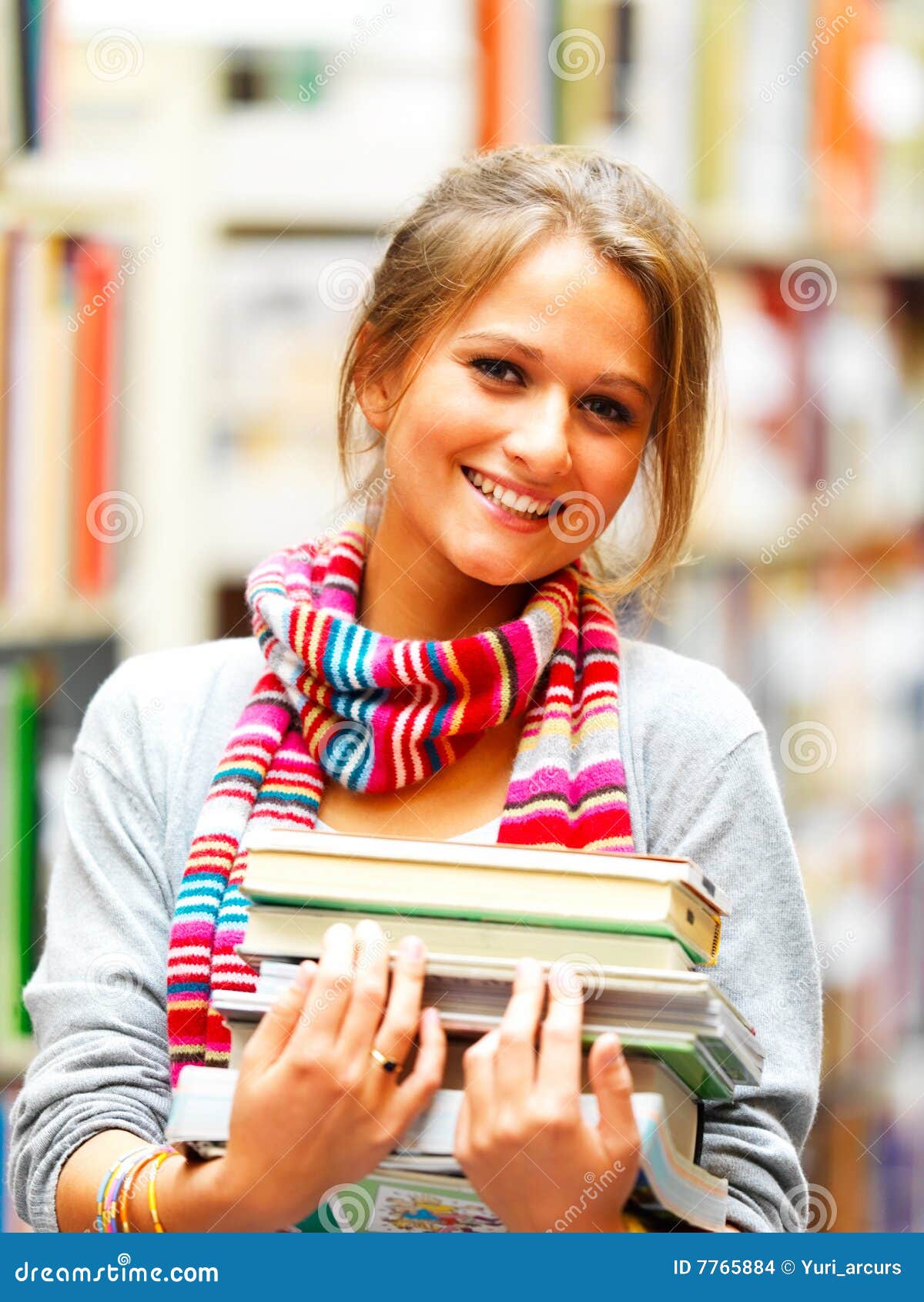 Pretty Smiling Lady Holding Books in Library Stock Photo - Image of ...