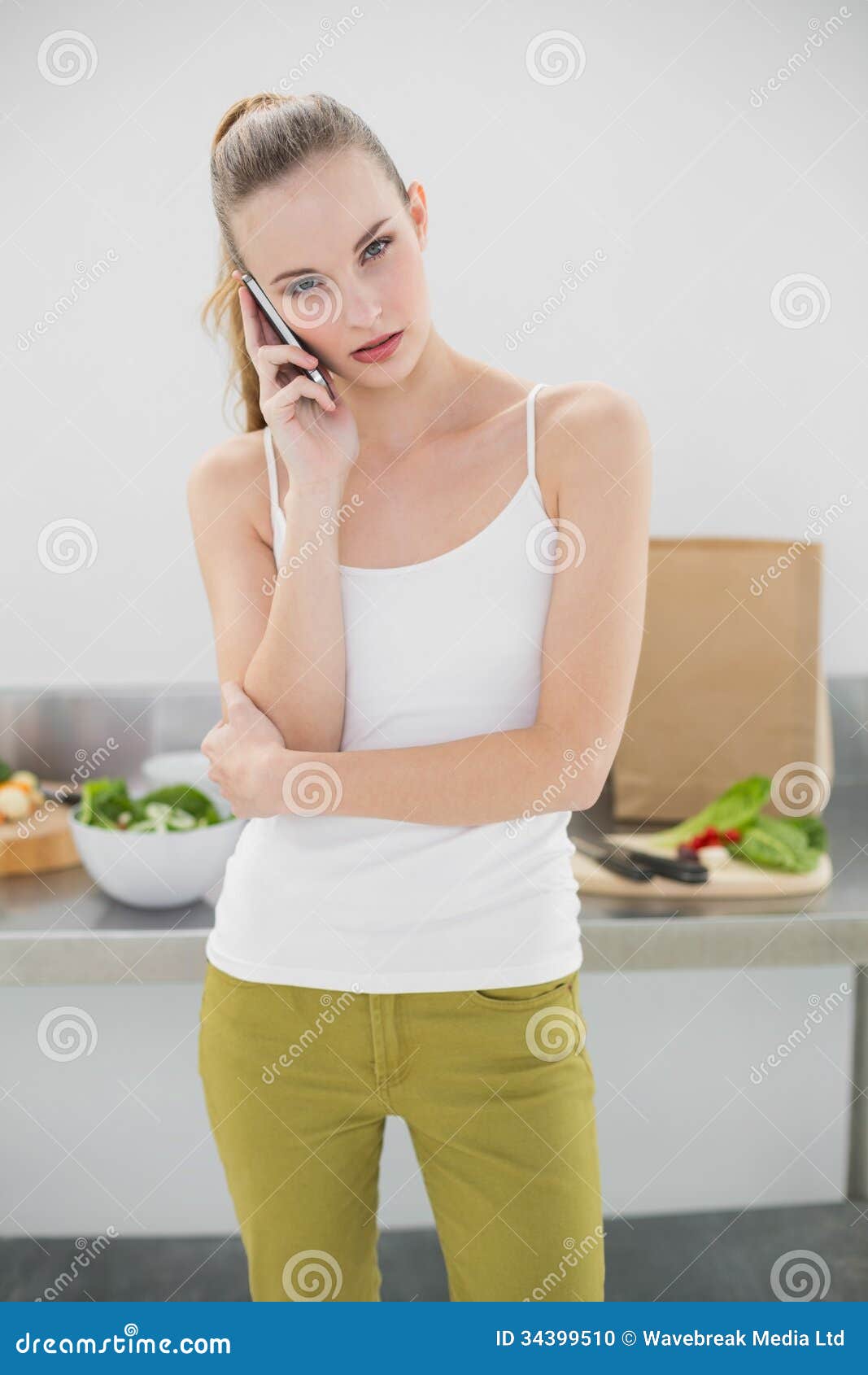 Pretty stern woman phoning stock photo. Image of 2024 - 34399510