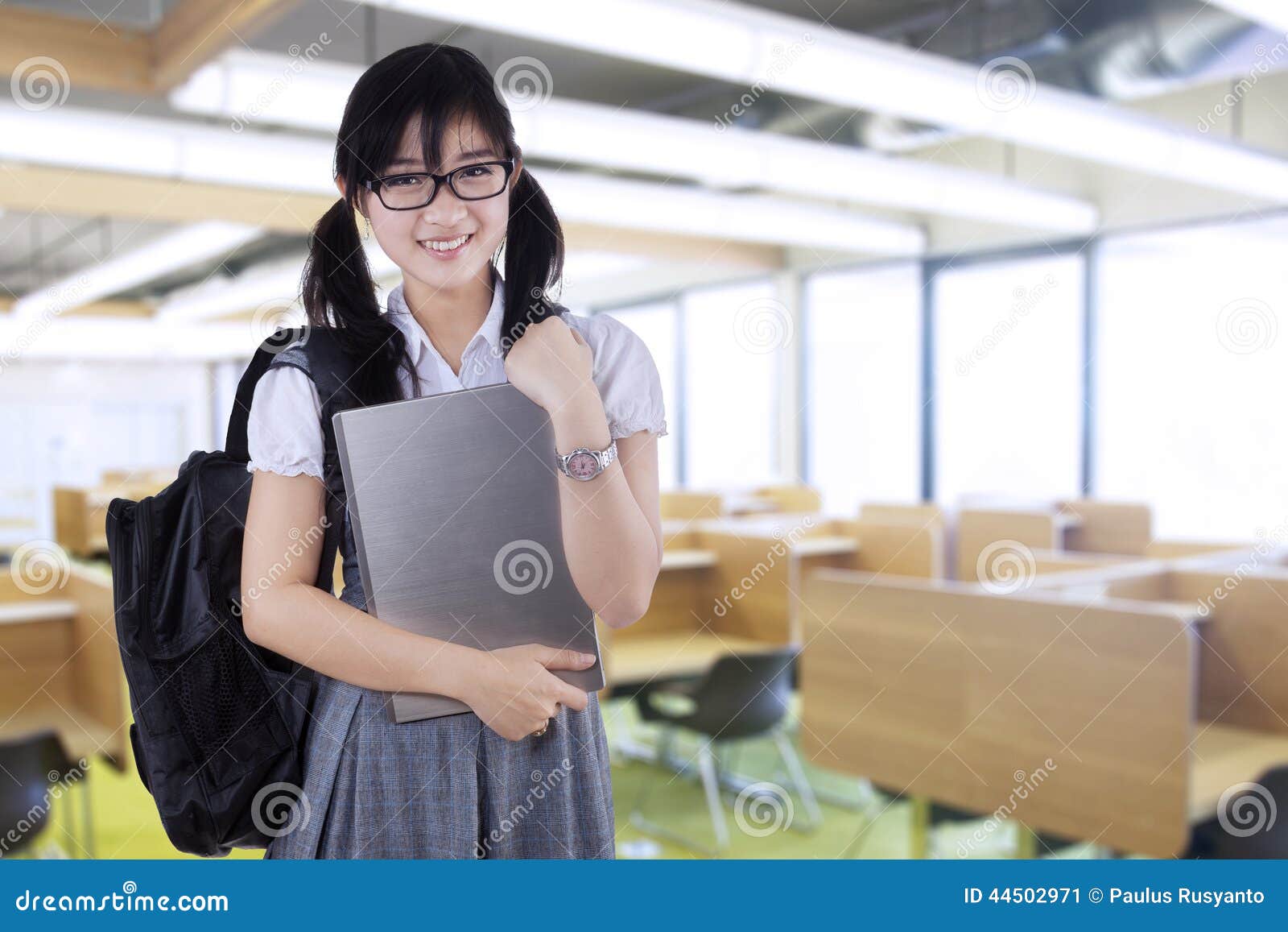 Pretty Student Holding Laptop in Class Stock Image - Image of holding ...