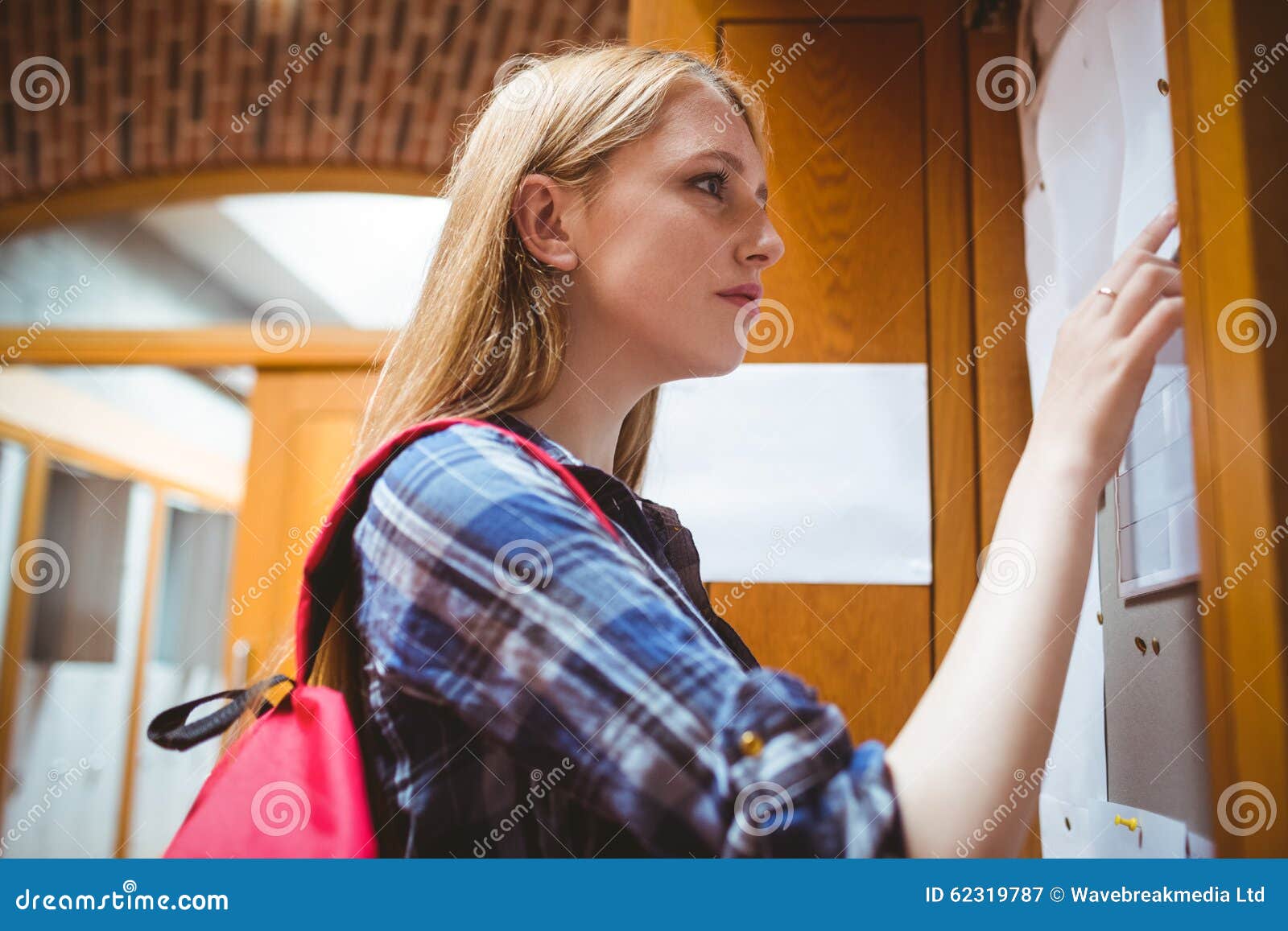 Pretty Student Looking at Notice-board Stock Image - Image of casual ...