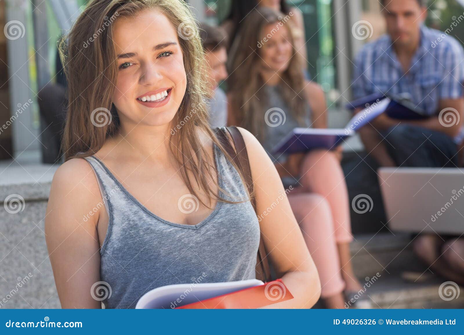Pretty Student Smiling at Camera Outside Stock Photo - Image of ...