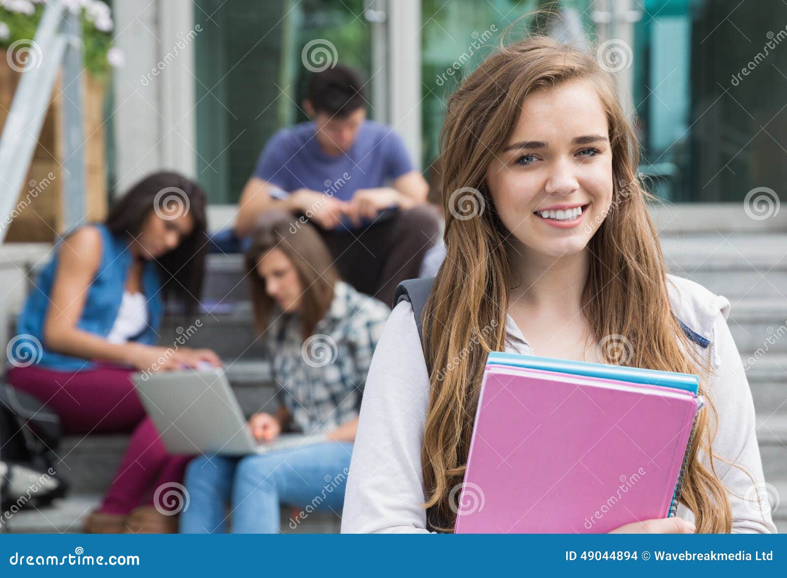 Pretty Student Smiling at Camera Outside Stock Photo - Image of view ...