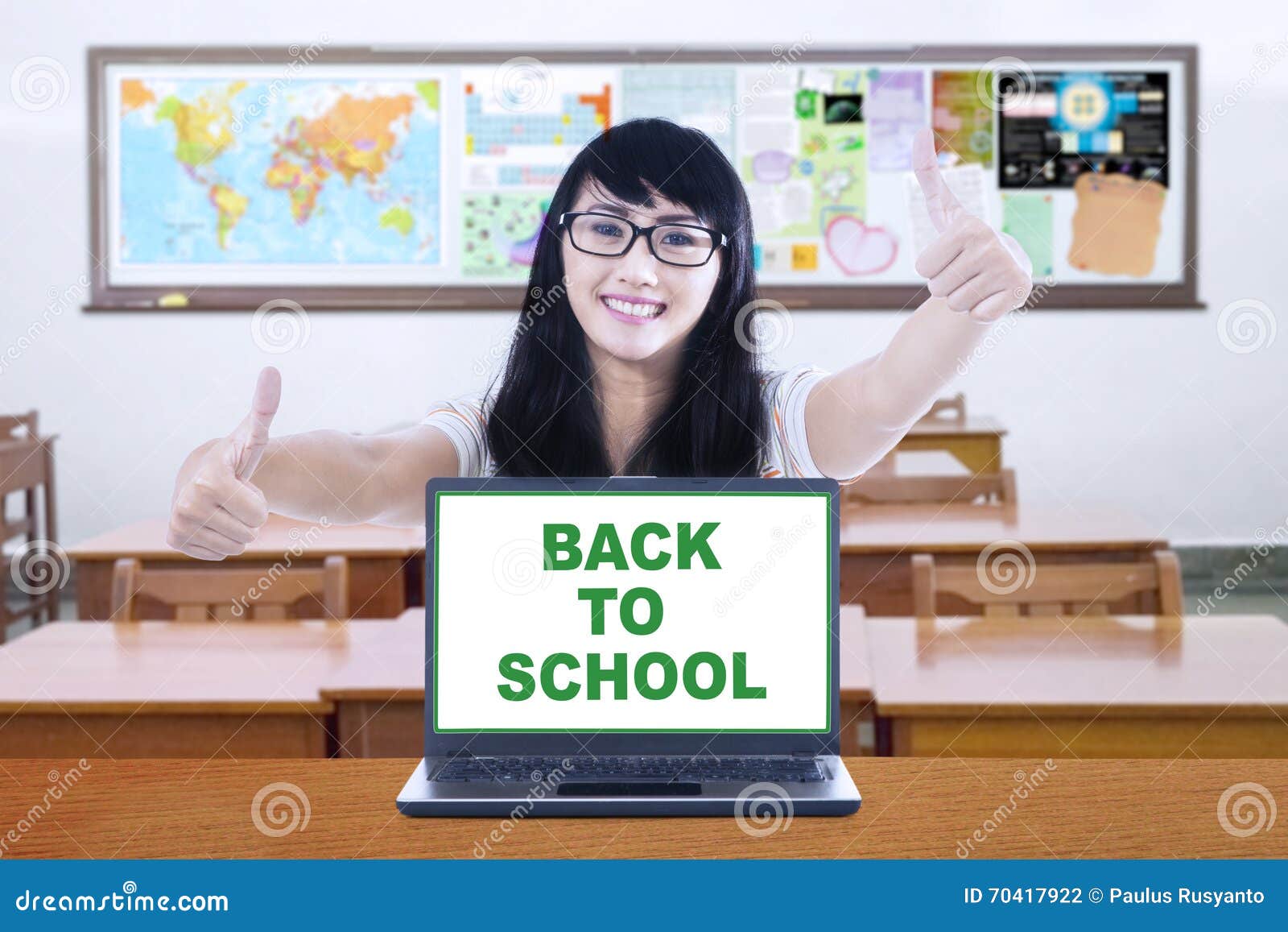 Pretty Student with Thumbs Up in Class Stock Photo - Image of knowledge ...