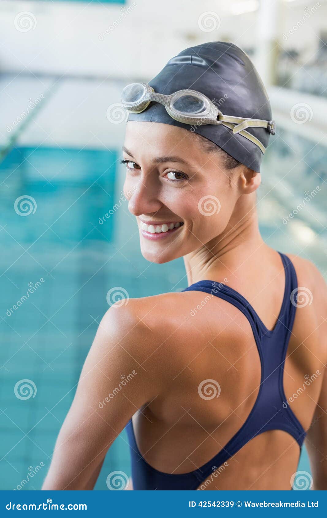Pretty Swimmer Standing by the Pool Smiling at Camera Stock Image ...
