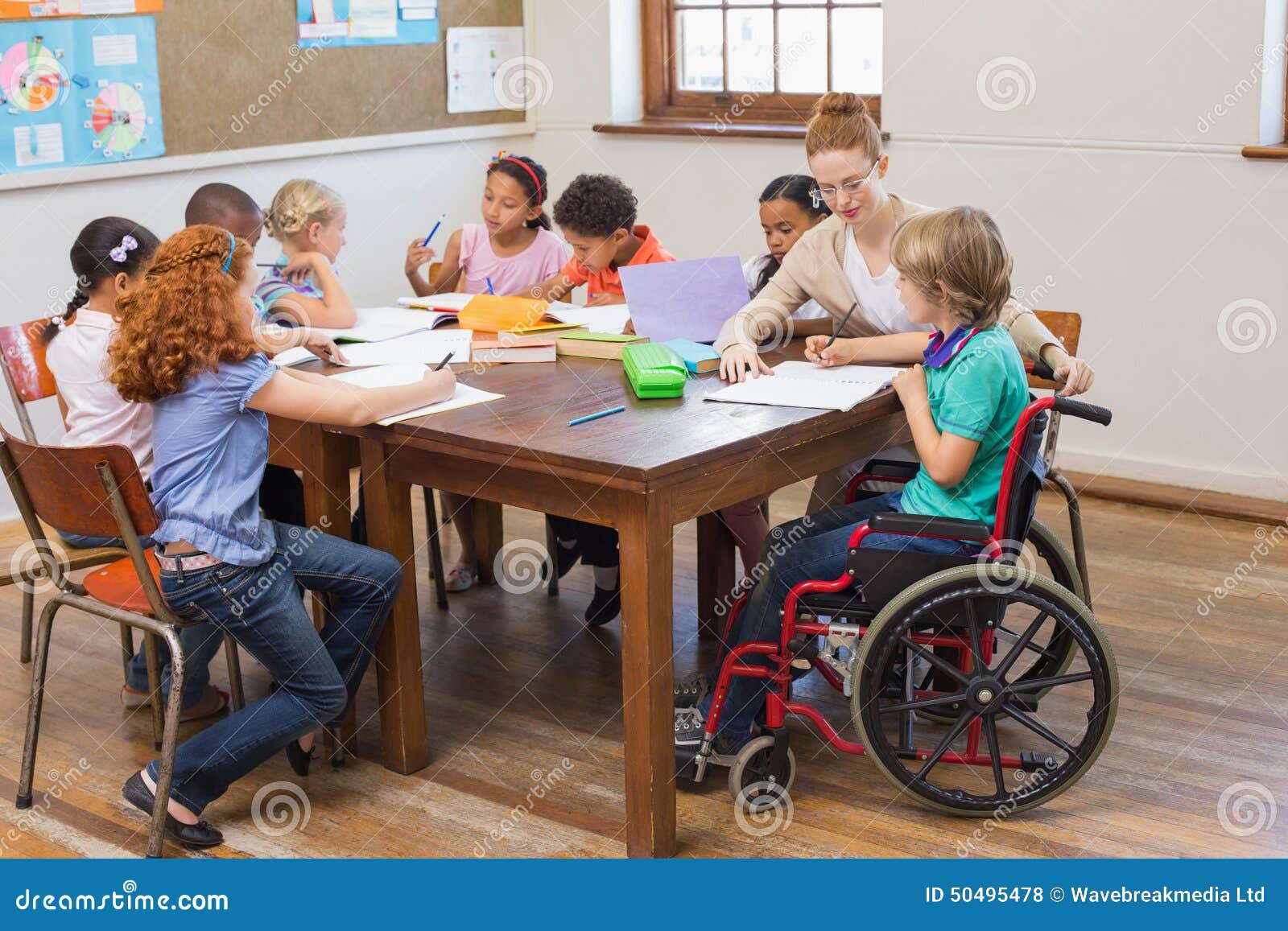 Elementary Pupils Counting With Teacher In Classroom Royalty-Free Stock ...