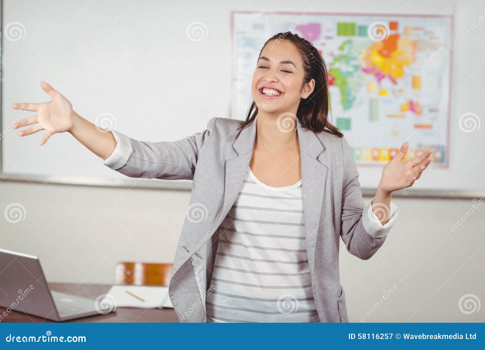Pretty Teacher Teaching in a Classroom Stock Image - Image of brown ...