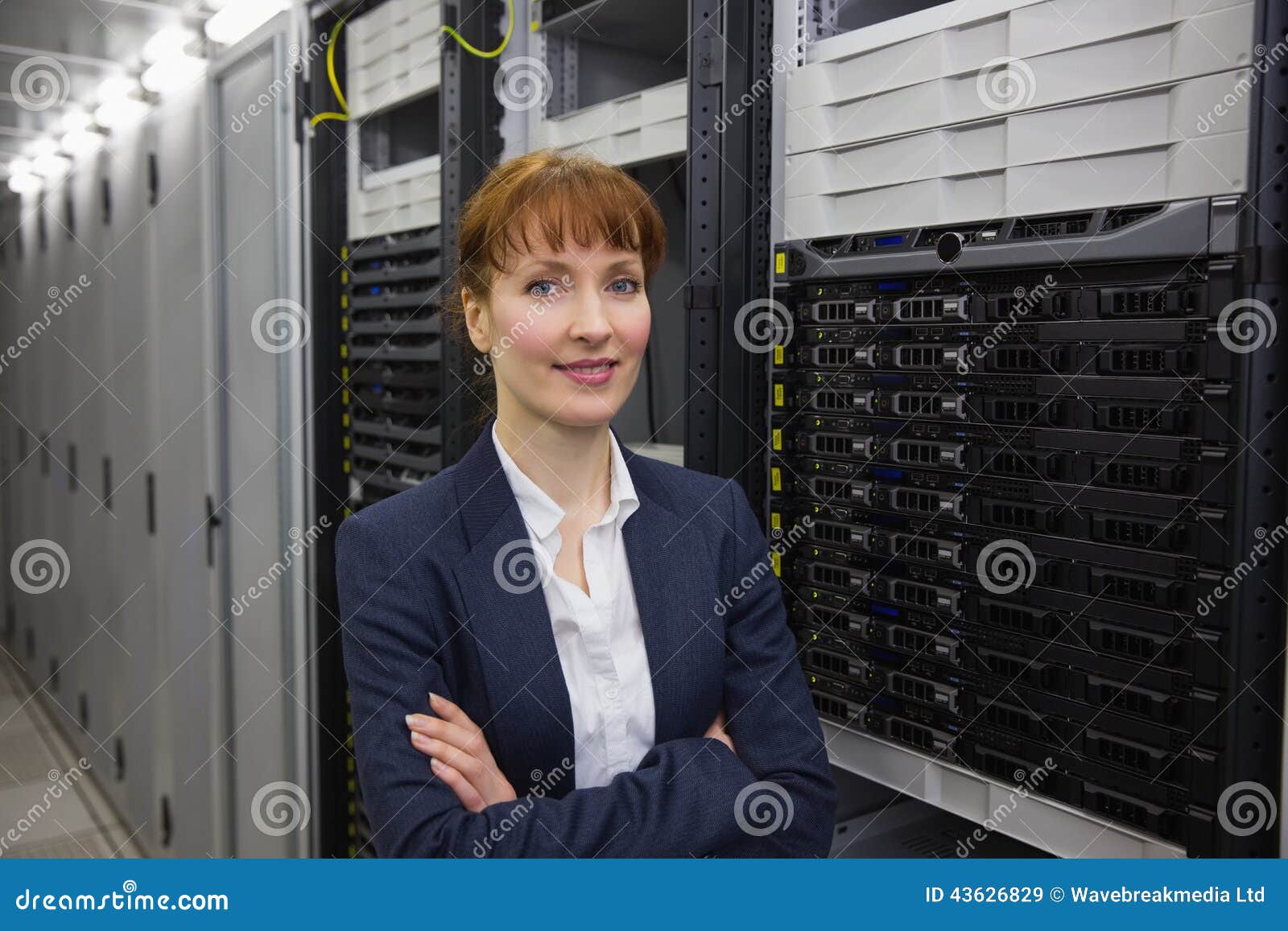 Pretty Technician Smiling at Camera beside Server Tower Stock Image ... Pretty Technician Smiling at Camera beside Server Tower Stock Image ...
