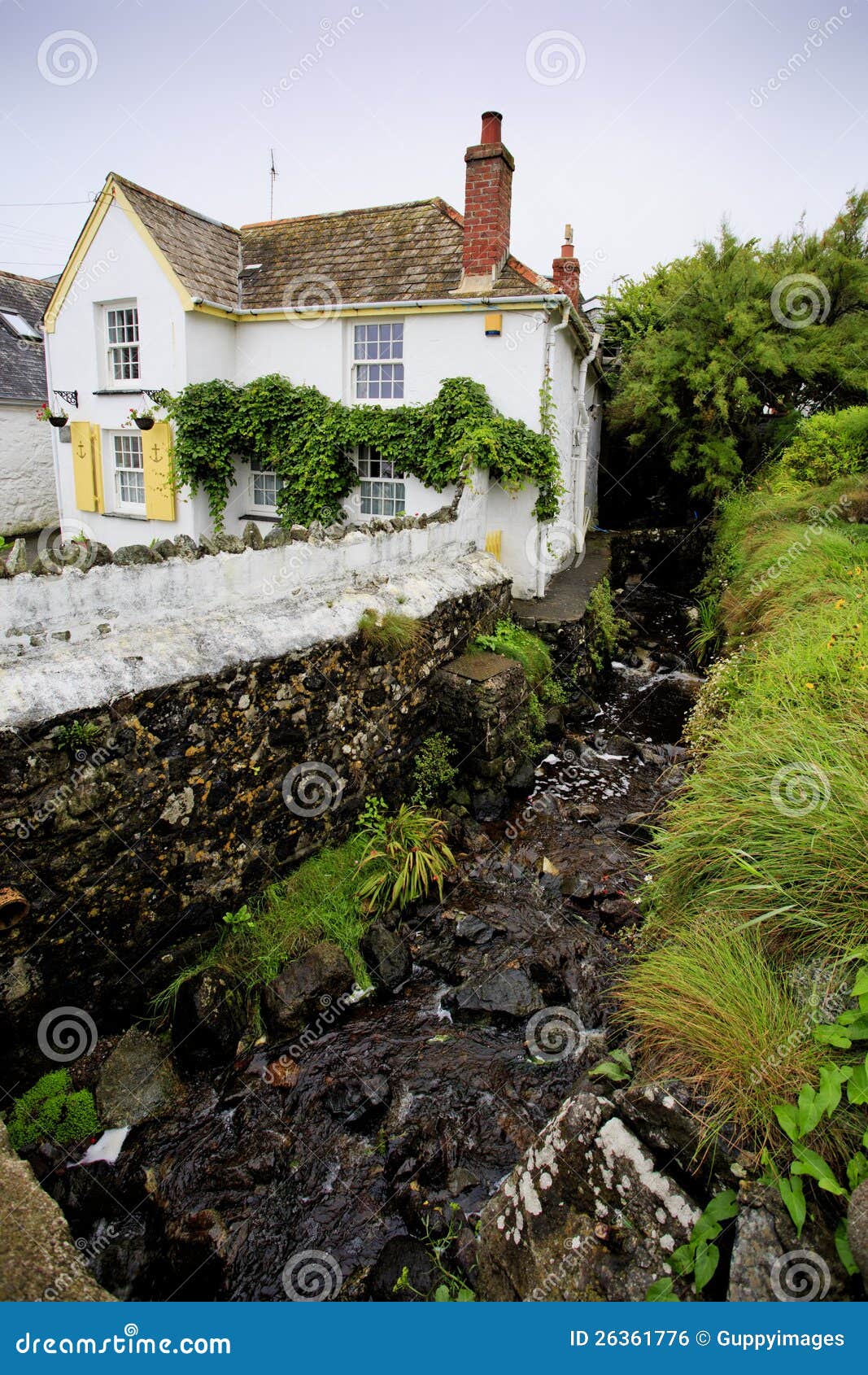 Pretty Traditional House by a Stream Stock Photo - Image of river ...