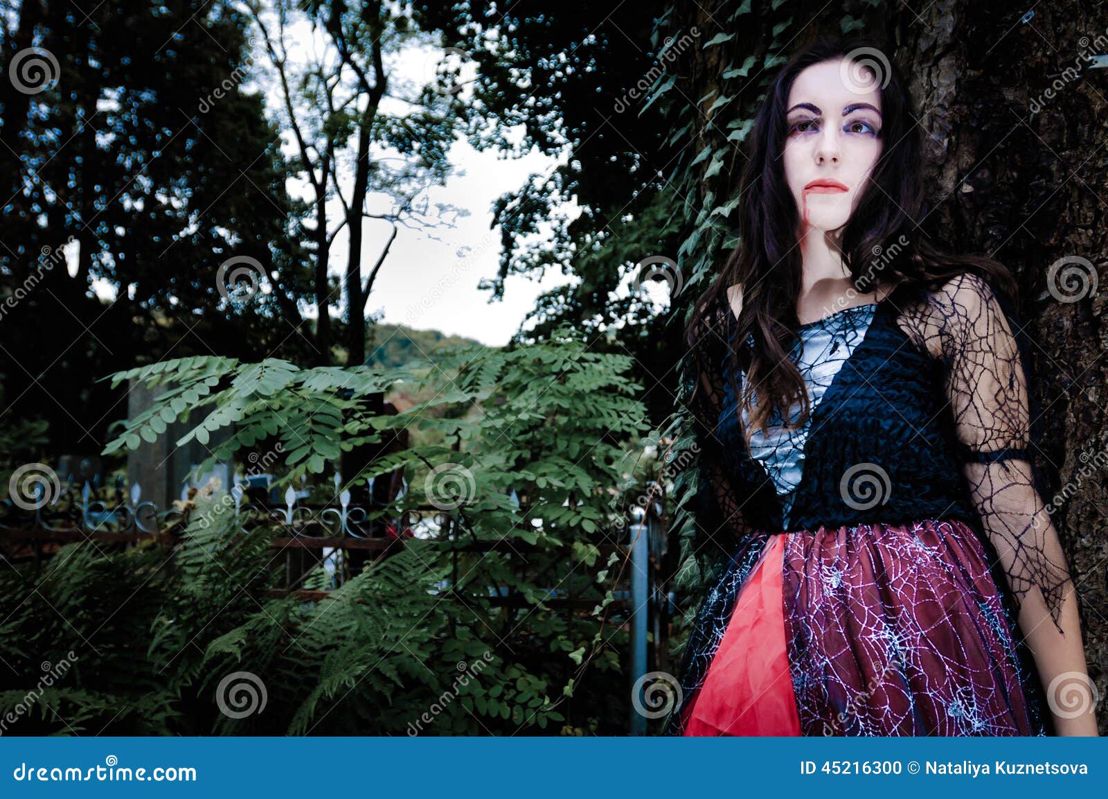 Pretty vampire near tree stock photo. Image of long, fantasy - 45216300
