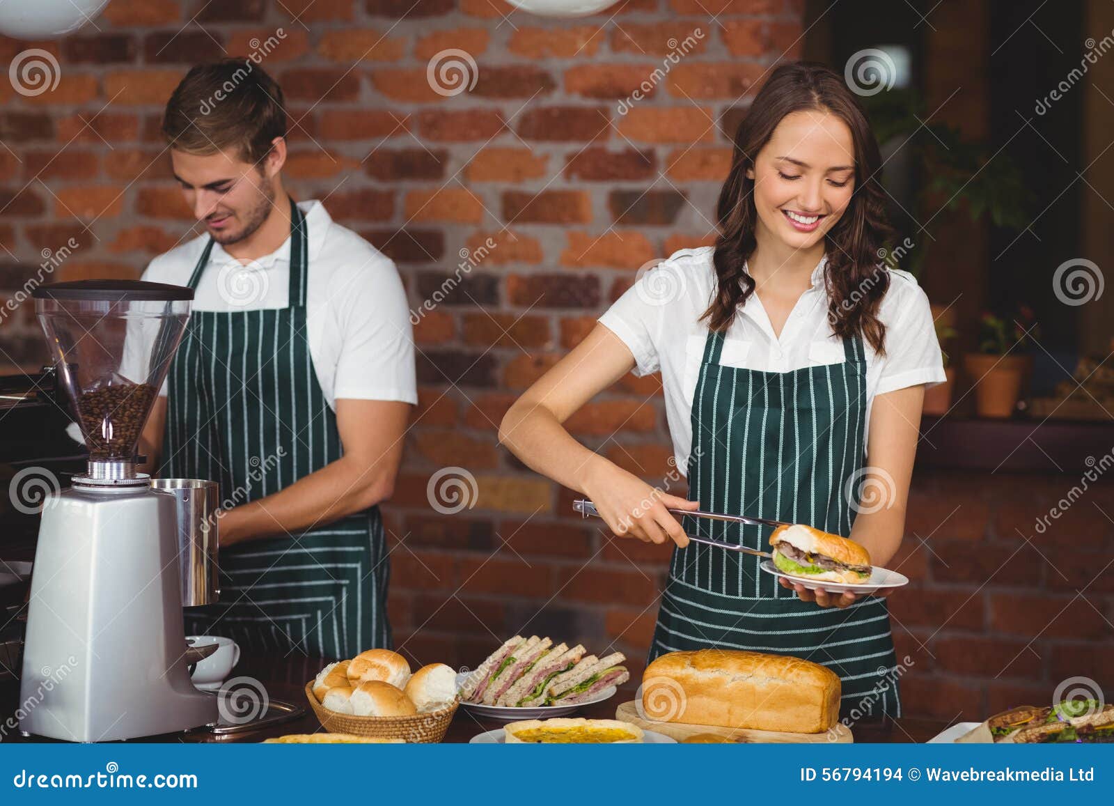 Pretty Waitress Posing With Tea For Guests Royalty-Free Stock Photo ...