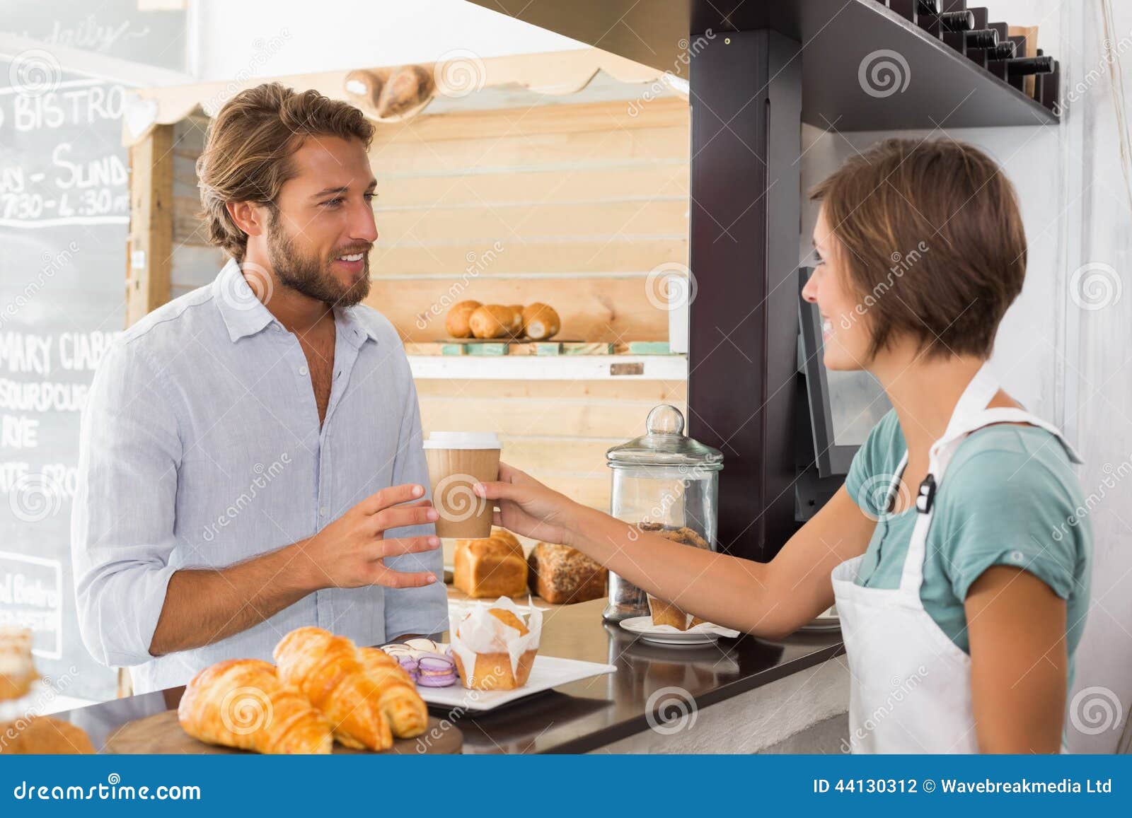 Pretty Waitress Serving Happy Customer Stock Photo - Image of standing ...
