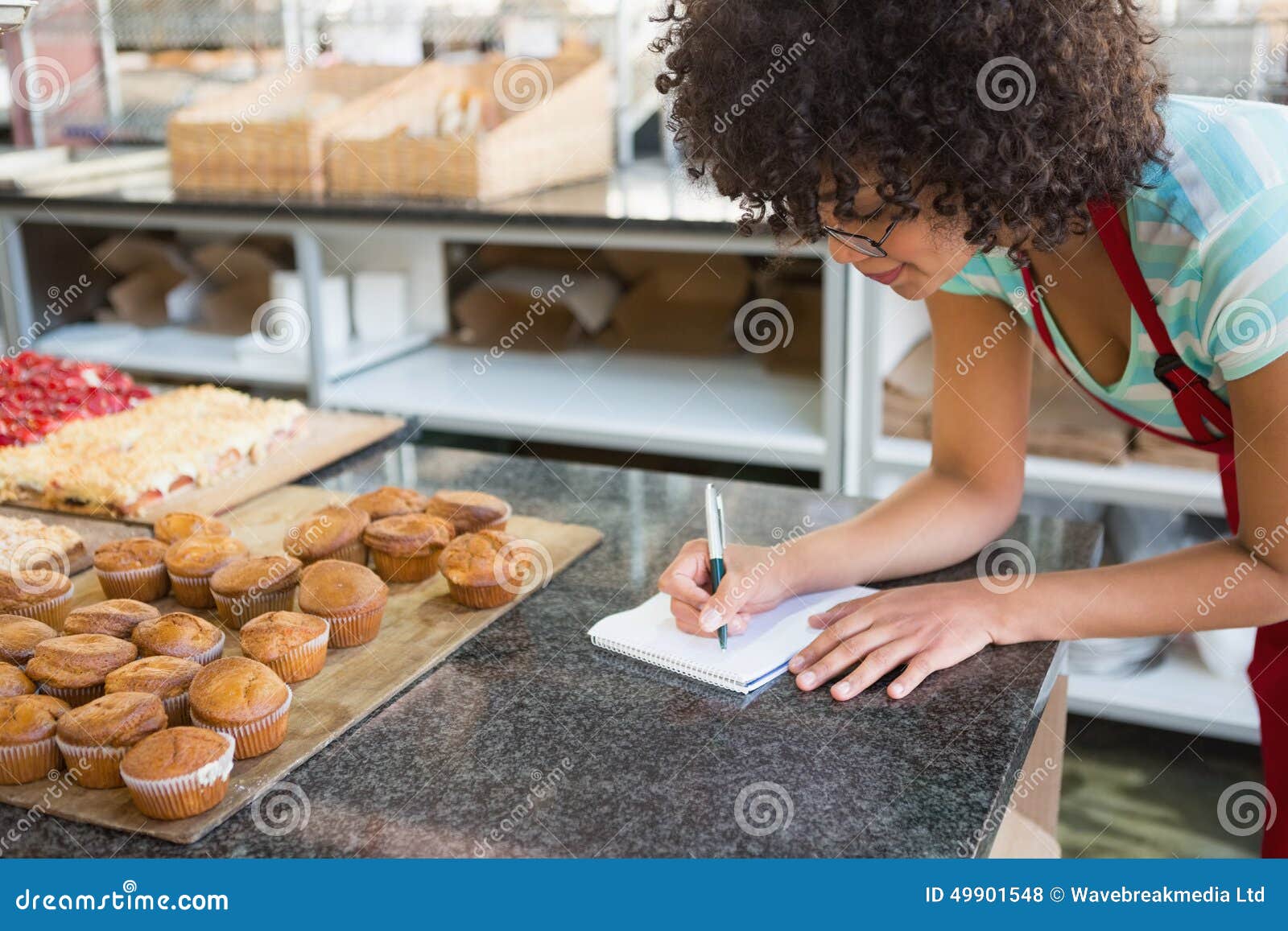 Pretty Waitress Writing on Notebook Stock Photo - Image of business ...