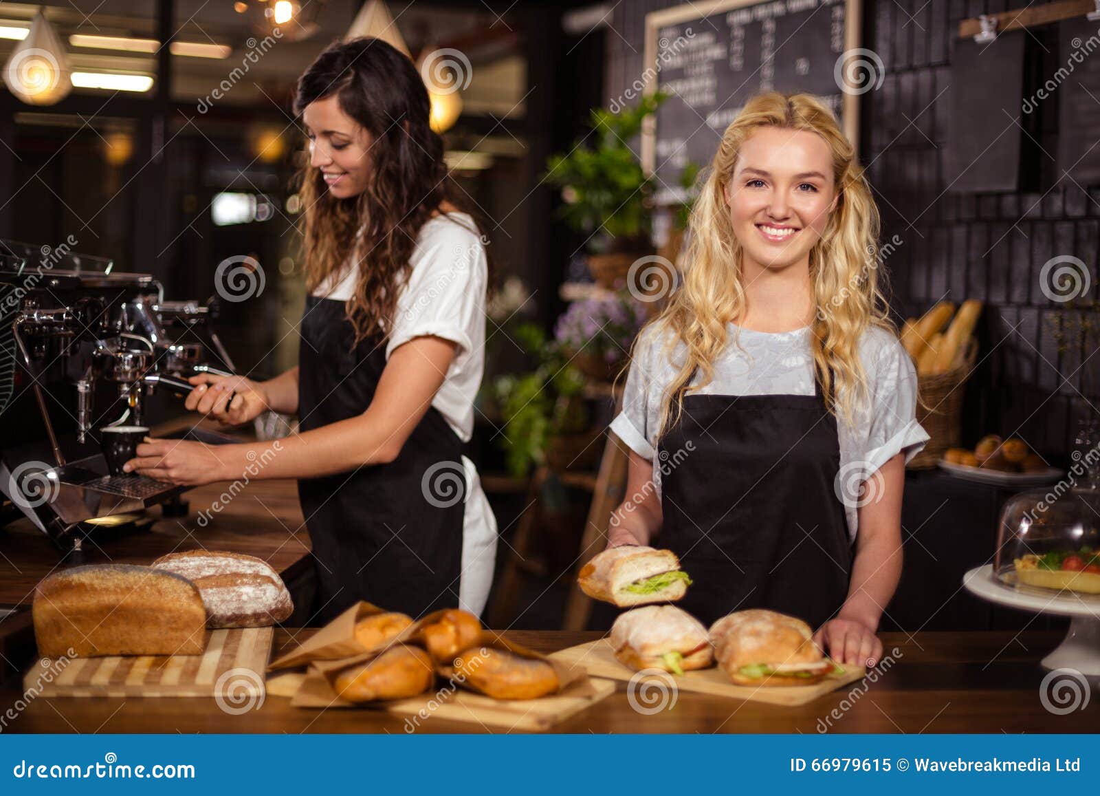 Pretty Waitresses Behind the Counter Working Stock Image - Image of ...