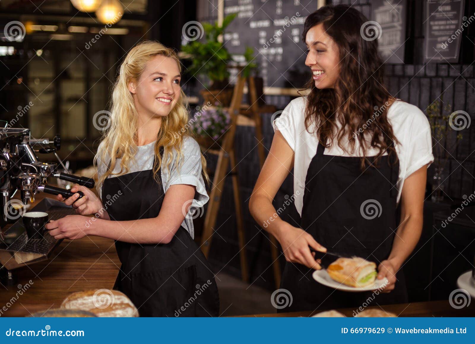 Pretty Waitresses Behind the Counter Working Stock Image - Image of ...