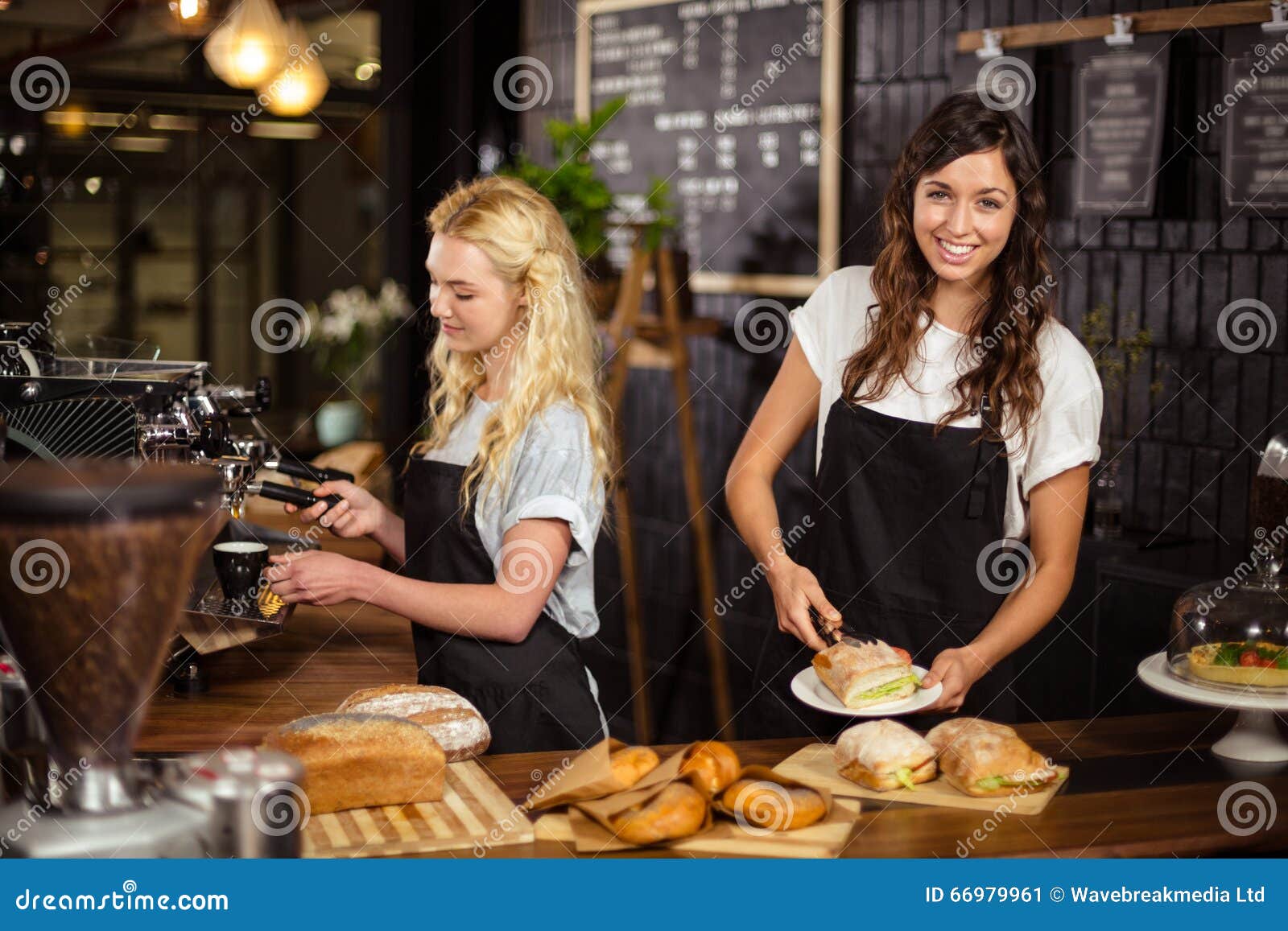 Pretty Waitresses Behind the Counter Working Stock Image - Image of ...