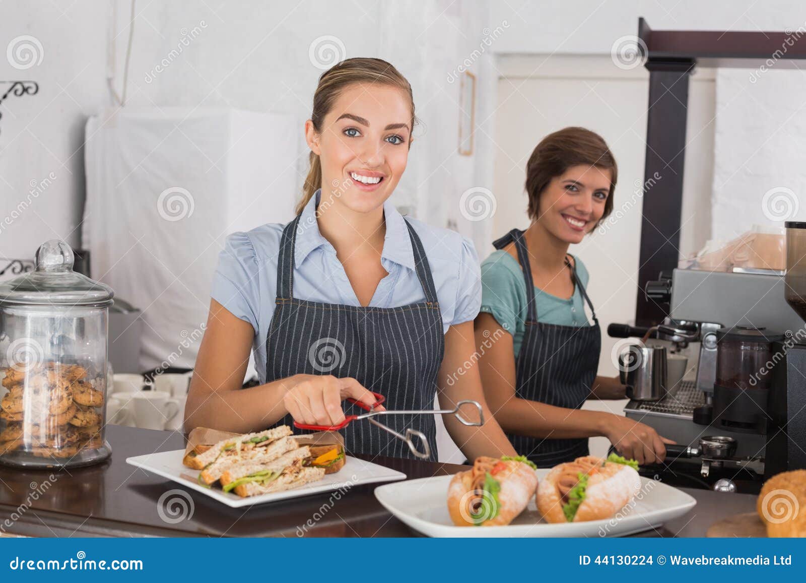 Pretty Waitresses Working with a Smile Stock Photo - Image of standing ...