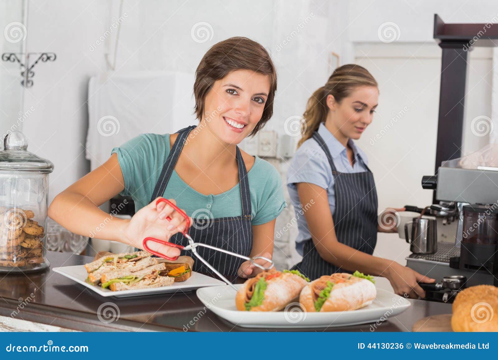 Pretty Waitresses Working with a Smile Stock Photo - Image of length ...