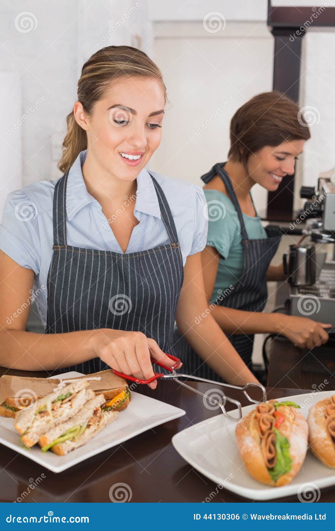 Pretty Waitresses Working with a Smile Stock Photo - Image of cafe ...