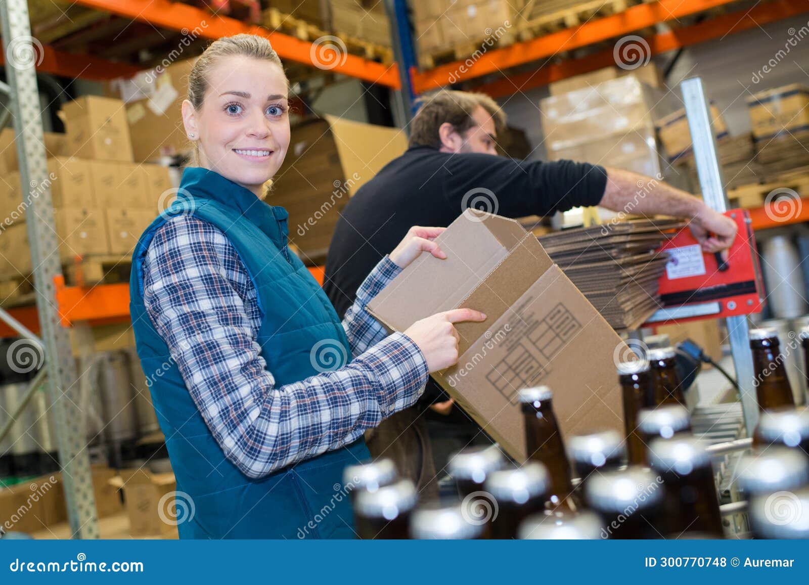 Pretty Warehouse Worker with Clipboard and Carton Box Stock Photo ...
