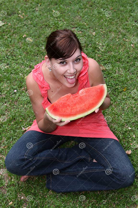 Pretty Watermelon Eater stock image. Image of happy, jeans - 13362355