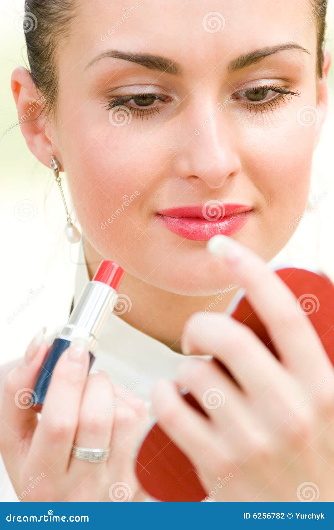 Pretty Woman Applying Cosmetics Stock Photo - Image of applying, girl ...