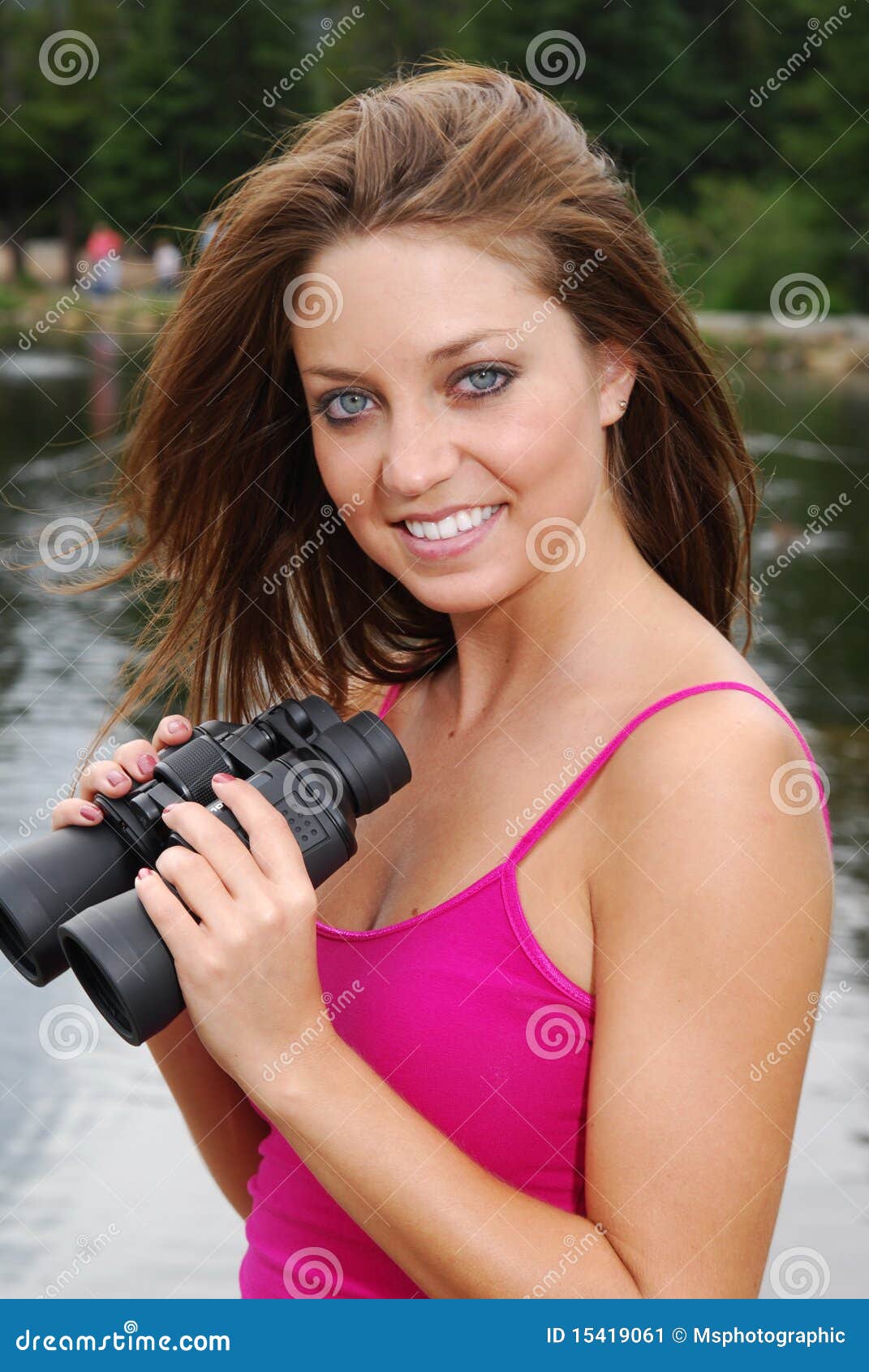 Pretty woman bird watching stock image. Image of summertime - 15419061