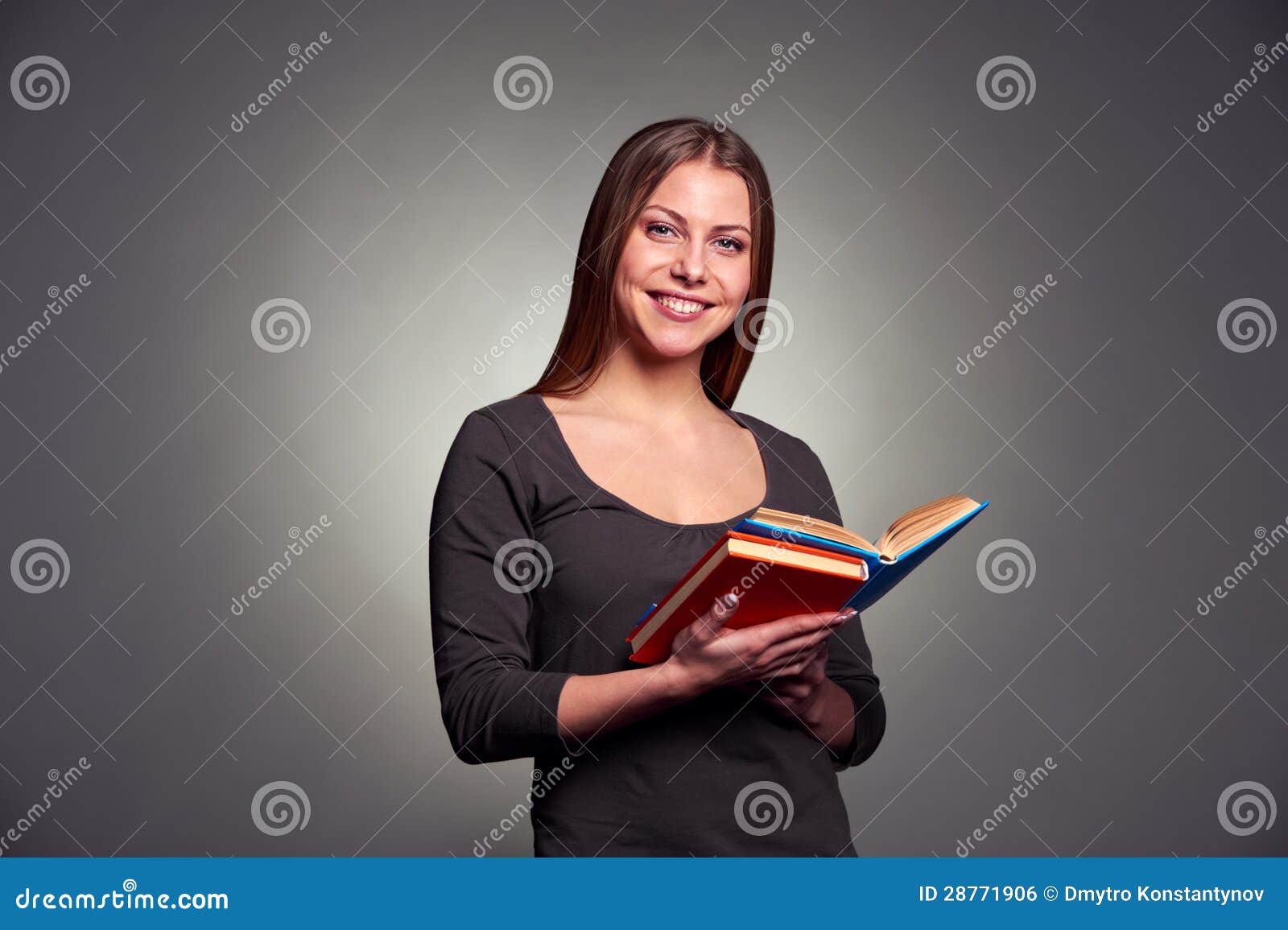Pretty woman with books stock photo. Image of happy, standing - 28771906