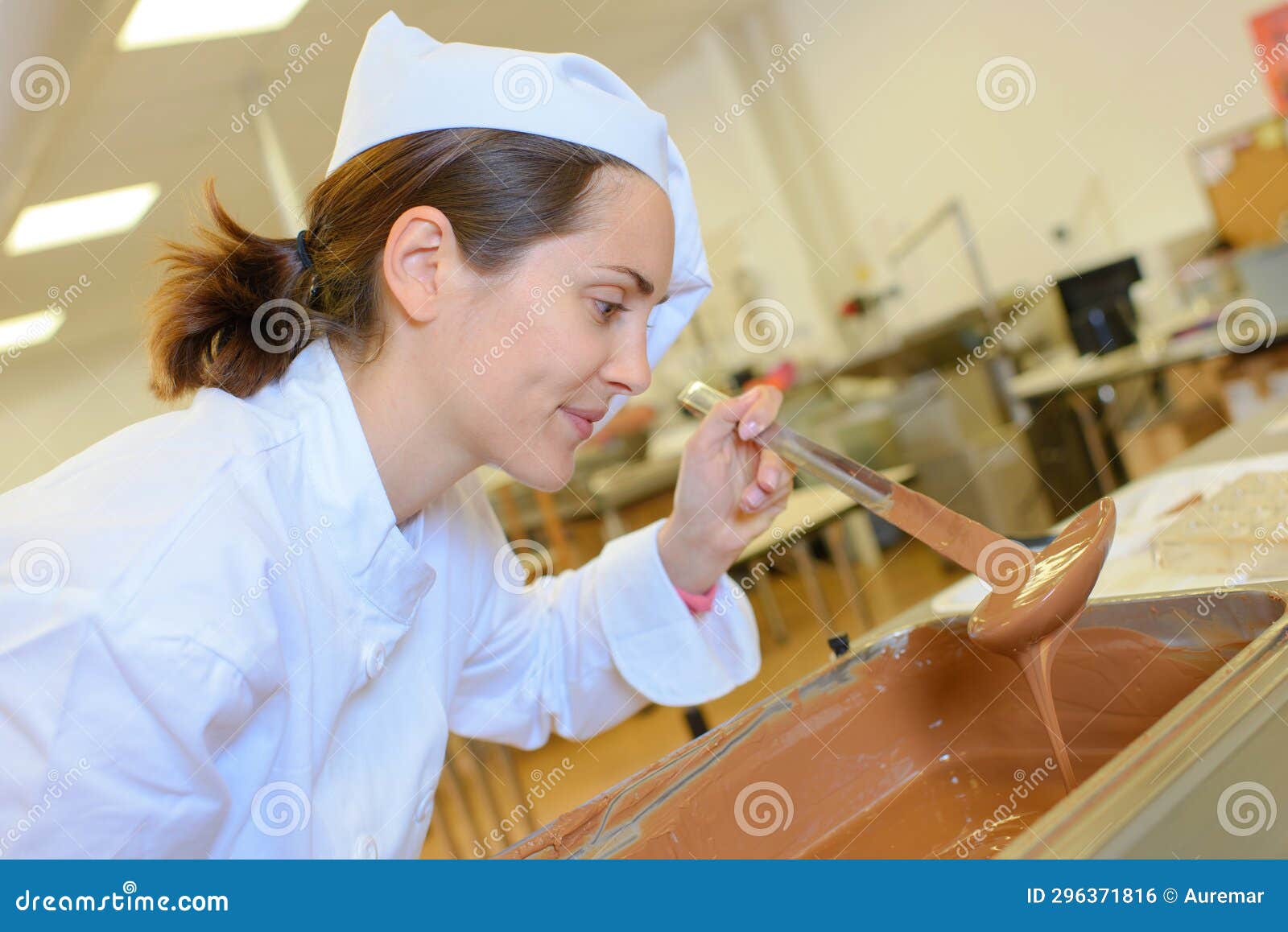 Pretty Woman Checking Fudge for Pastries Stock Photo - Image of cooking ...