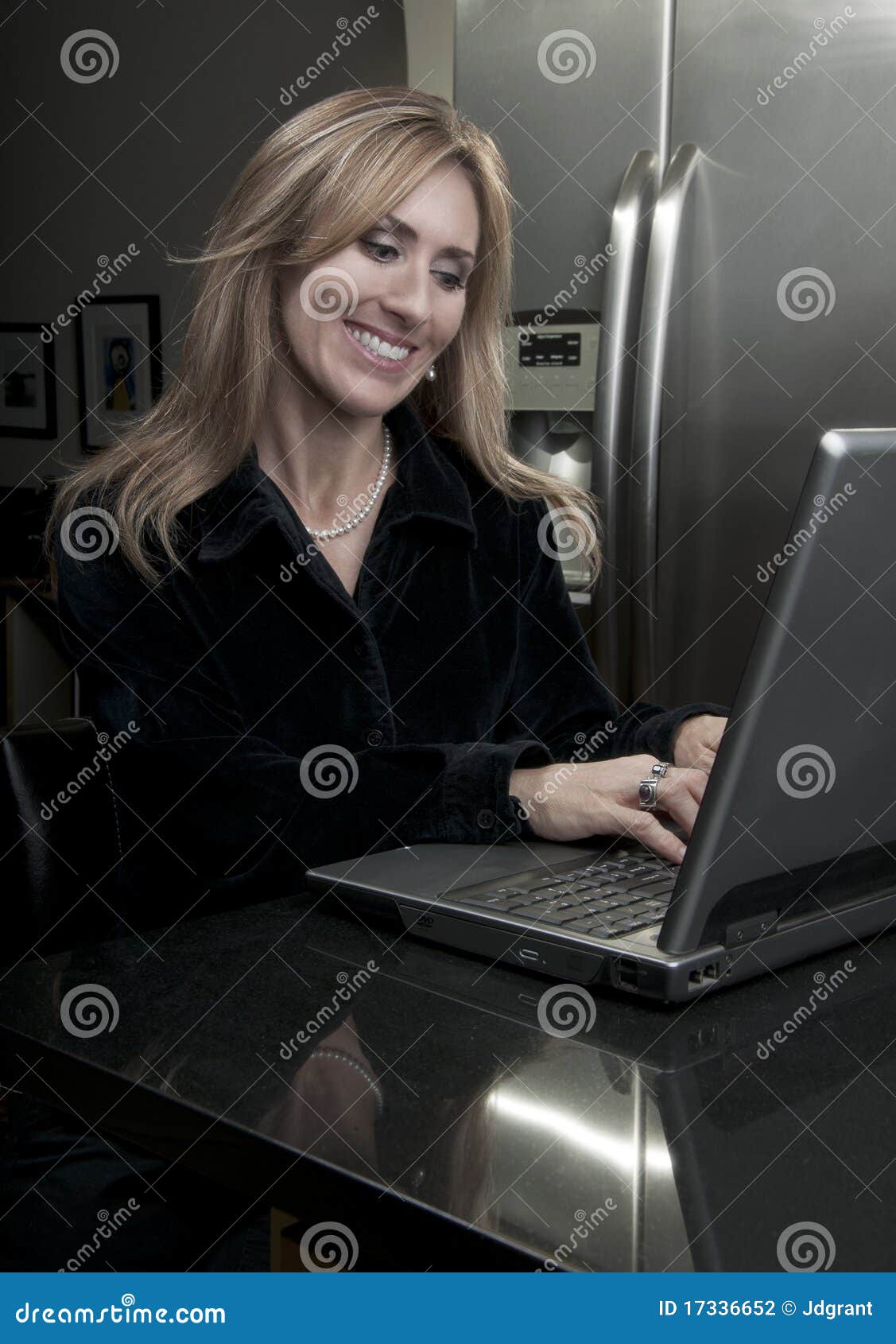 Pretty Woman on Computer stock photo. Image of mature - 17336652