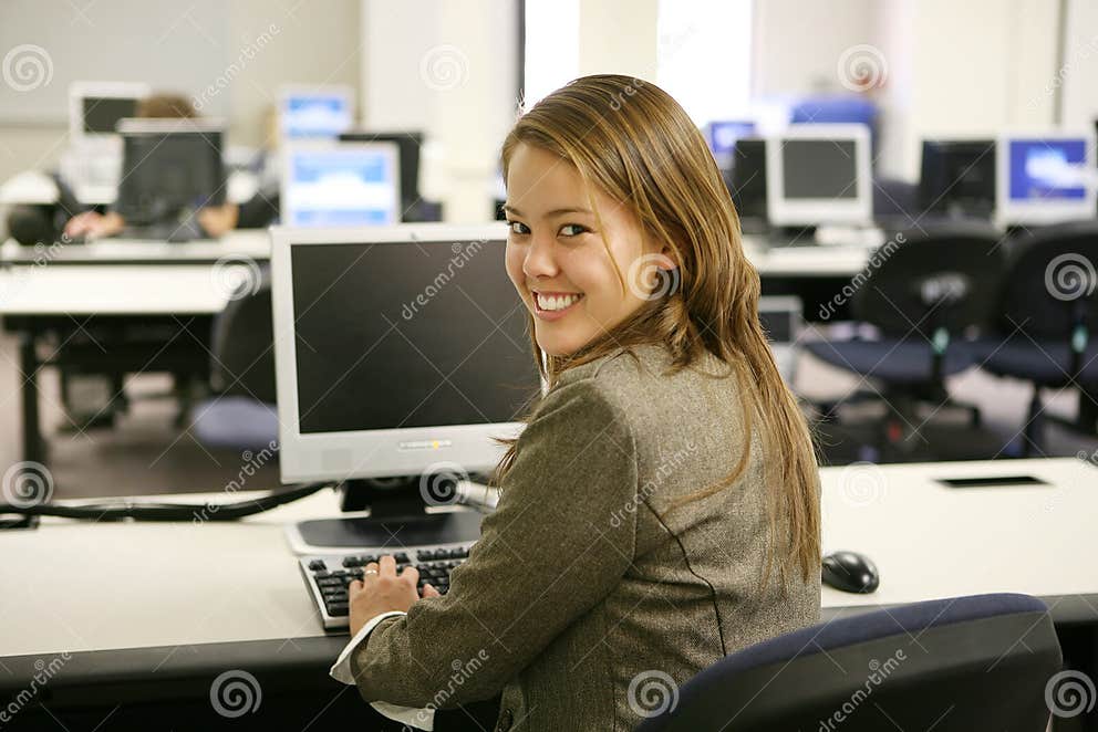 Pretty Woman in Computer Lab Stock Photo - Image of education, business ...
