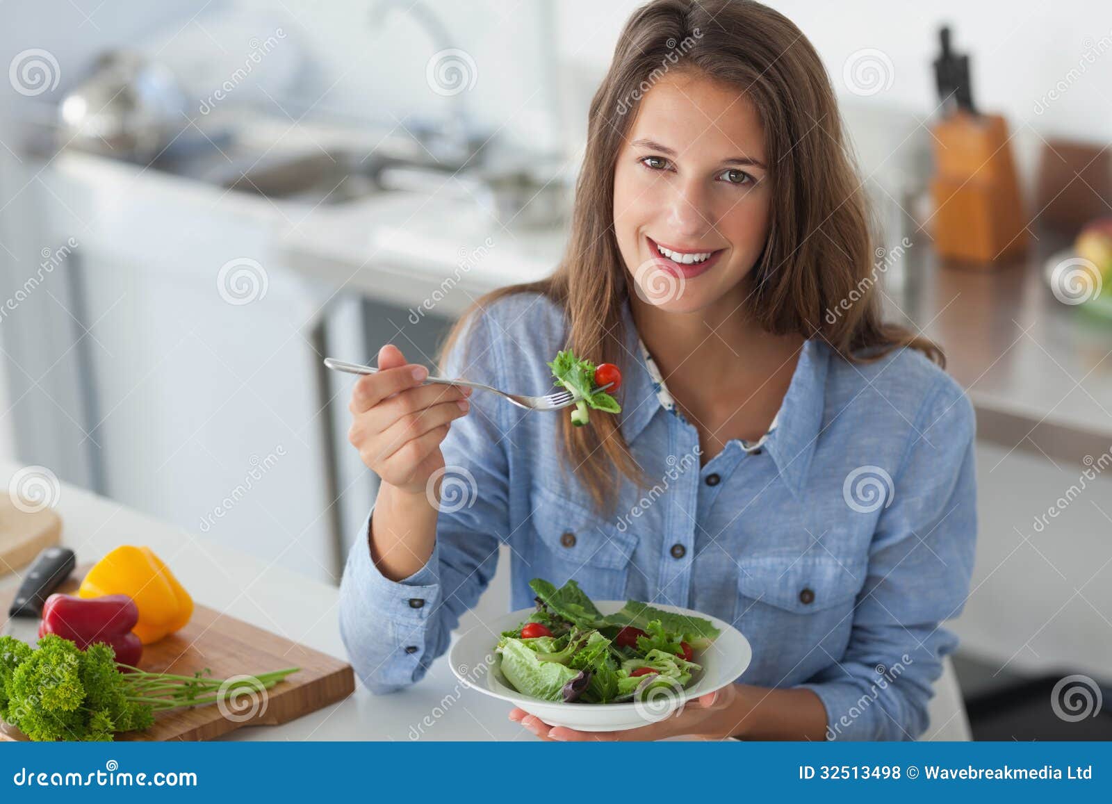 Pretty Woman Eating a Salad Stock Photo - Image of counter, brown: 32513498