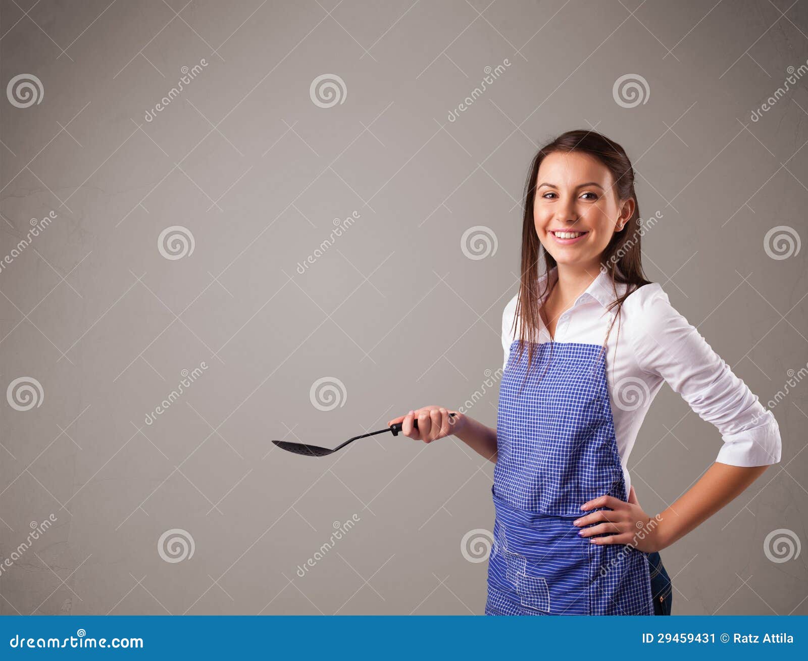 Pretty Woman Holding a Spoon Stock Image - Image of frying, cook: 29459431