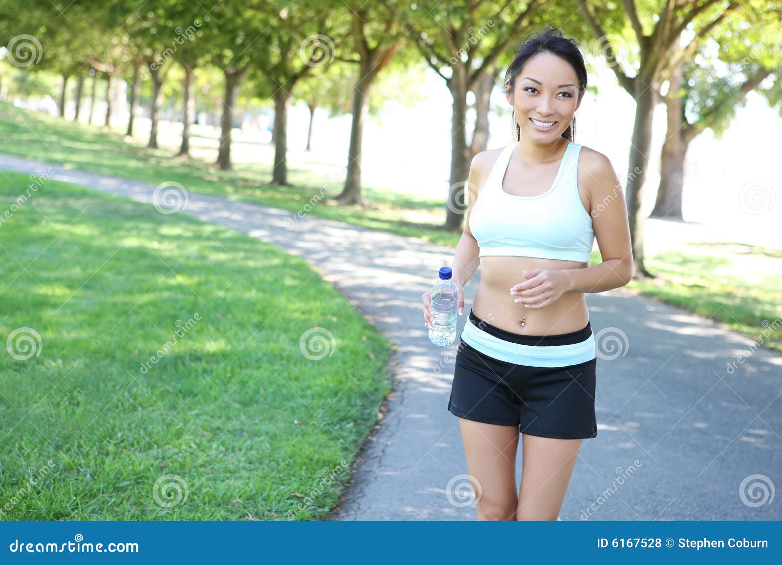 Pretty Woman Jogging in Park Stock Photo - Image of jogger, asian: 6167528