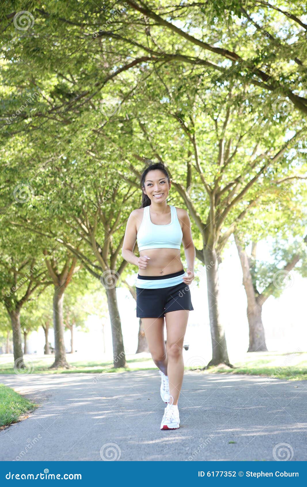 Pretty Woman Jogging in Park Stock Photo - Image of shoes, leisure: 6177352