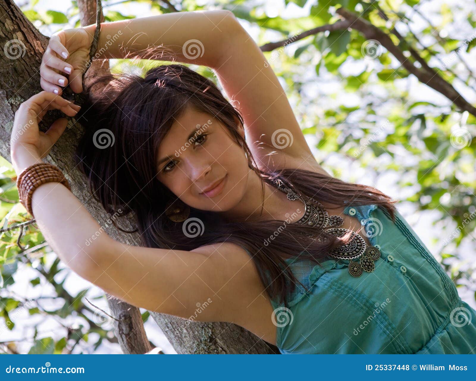 Pretty Woman Leaning Against Tree Stock Photo - Image of forest ...