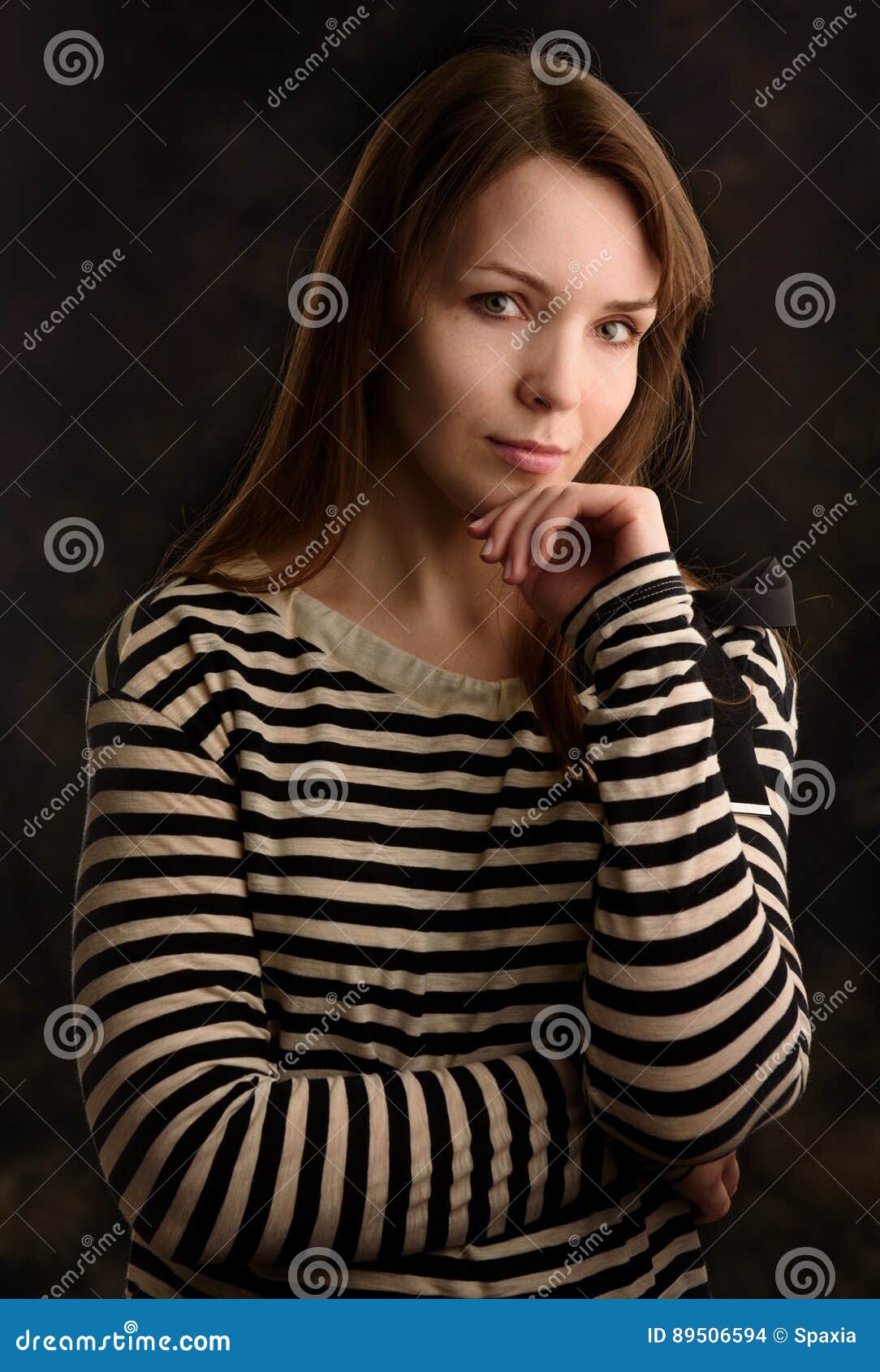Pretty Woman Looking at Camera and Thinking Stock Photo - Image of girl ...