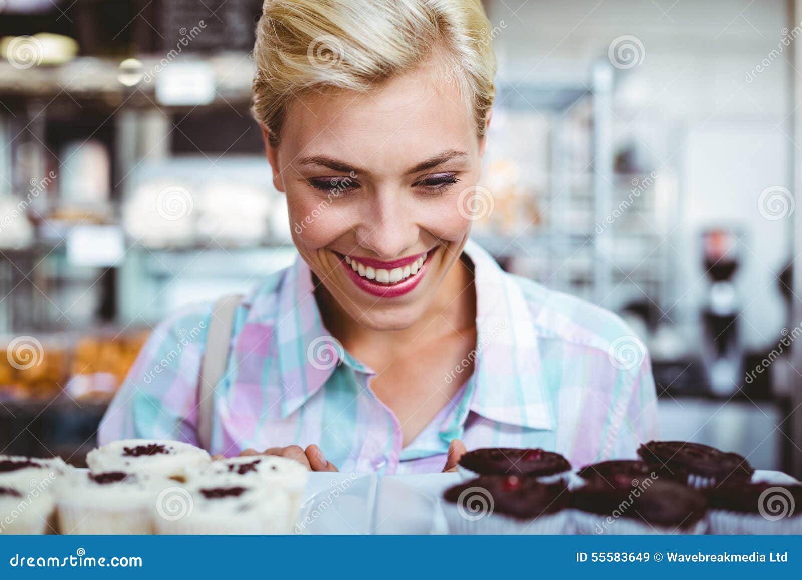 Pretty Woman Looking at Cup Cakes Stock Image - Image of blonde ...