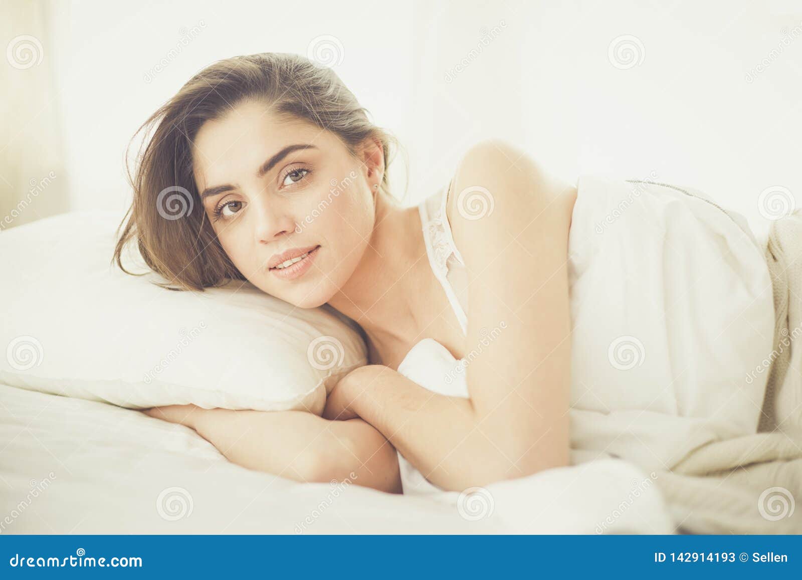 Pretty Woman Lying Down on Her Bed at Home Stock Image - Image of ...