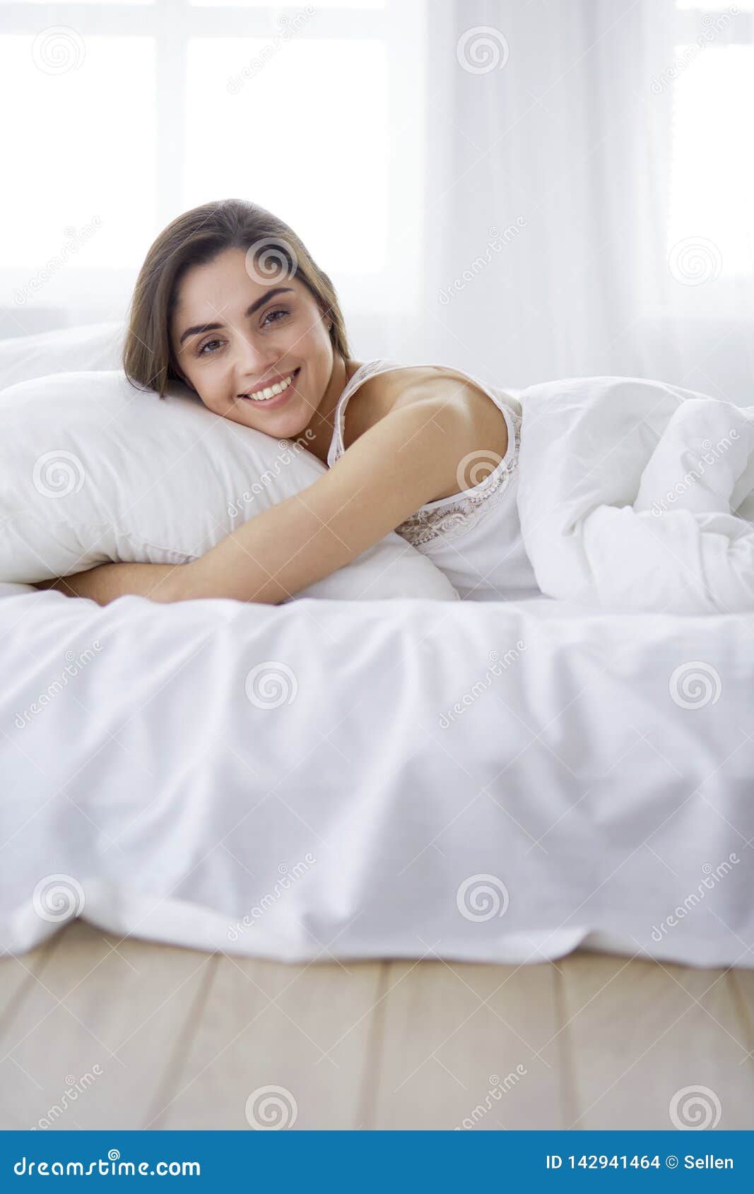 Pretty Woman Lying Down on Her Bed at Home Stock Photo - Image of ...