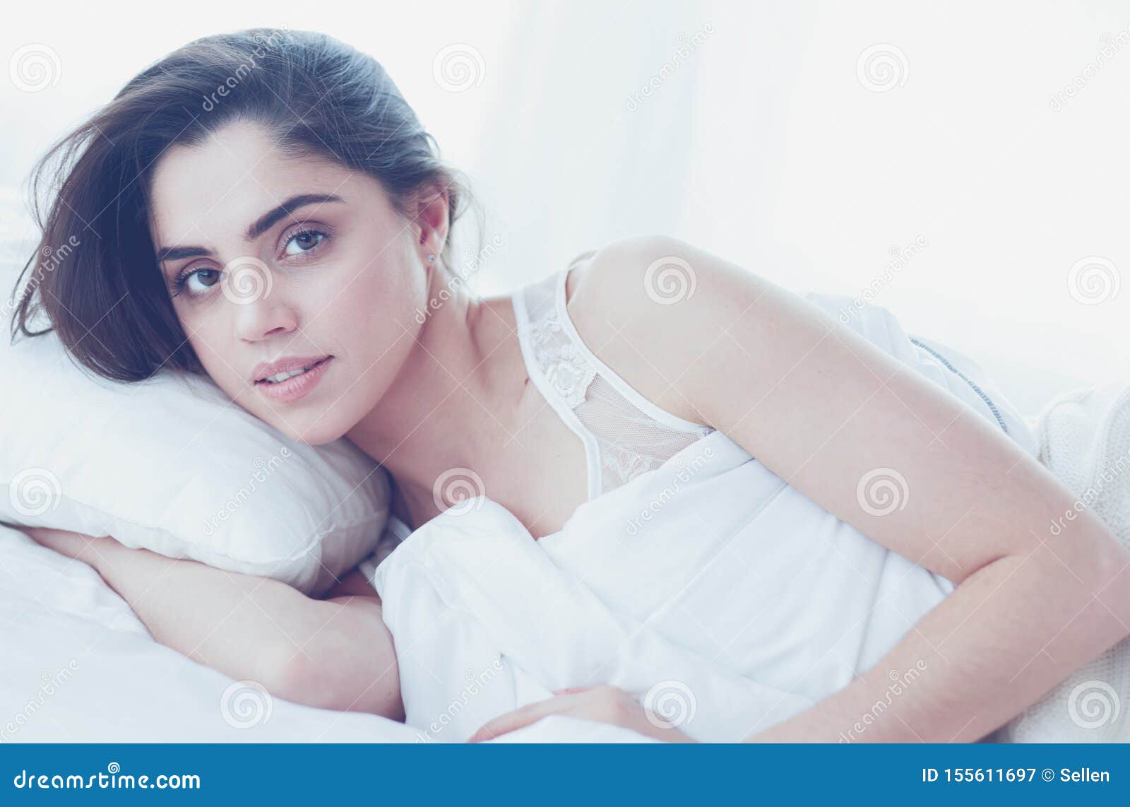 Pretty Woman Lying Down on Her Bed at Home Stock Image - Image of dream ...