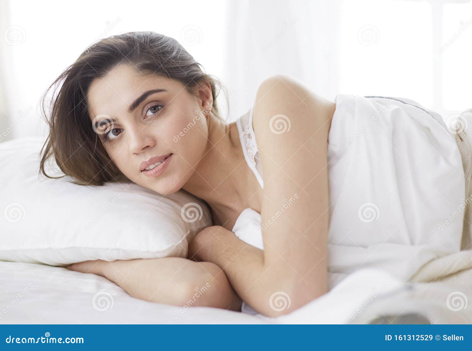 Pretty Woman Lying Down on Her Bed at Home Stock Image - Image of ...