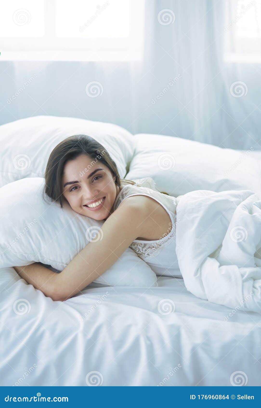 Pretty Woman Lying Down on Her Bed at Home Stock Photo - Image of cute ...
