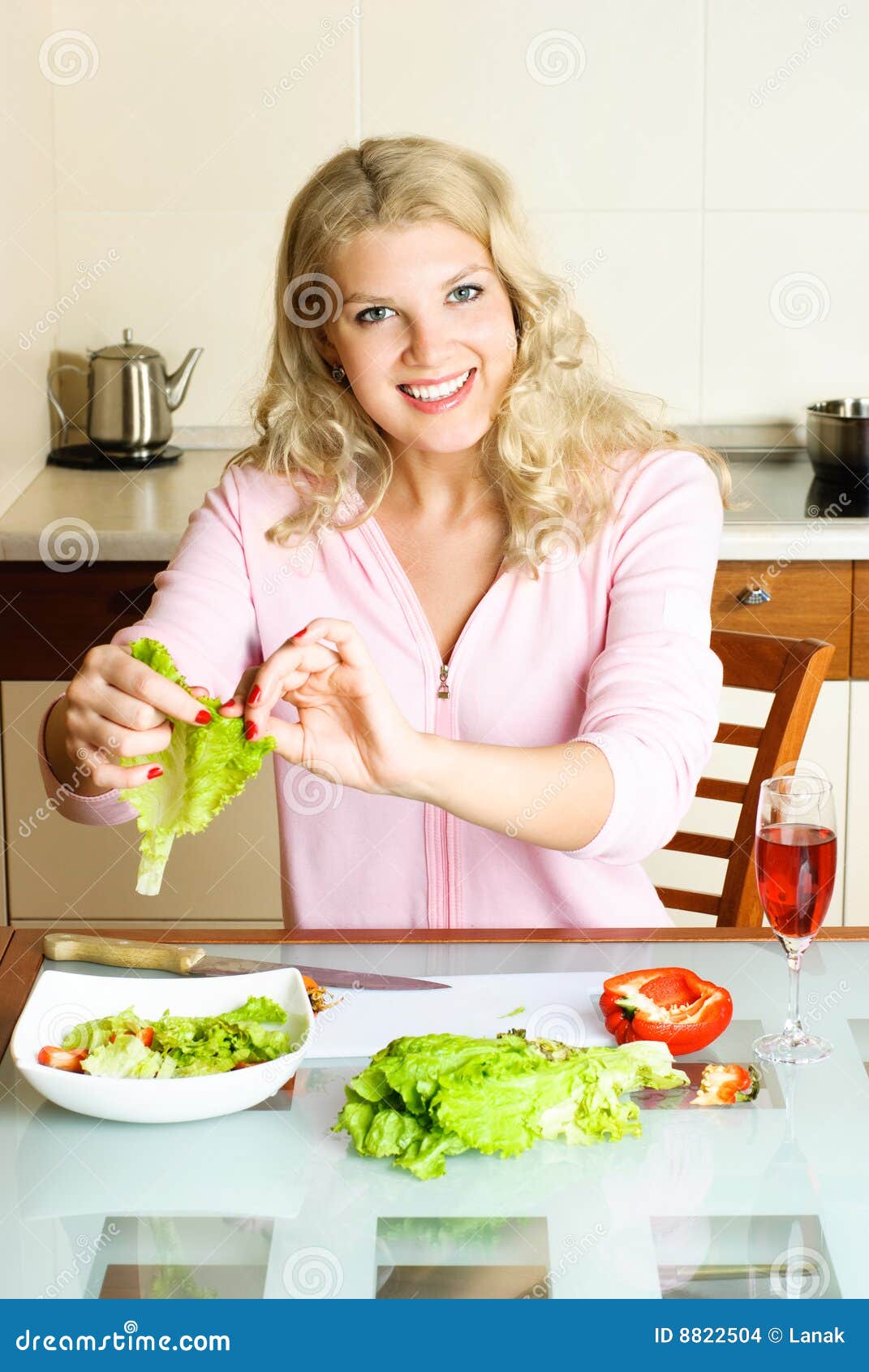 Pretty woman making salad stock photo. Image of diet, housewife - 8822504