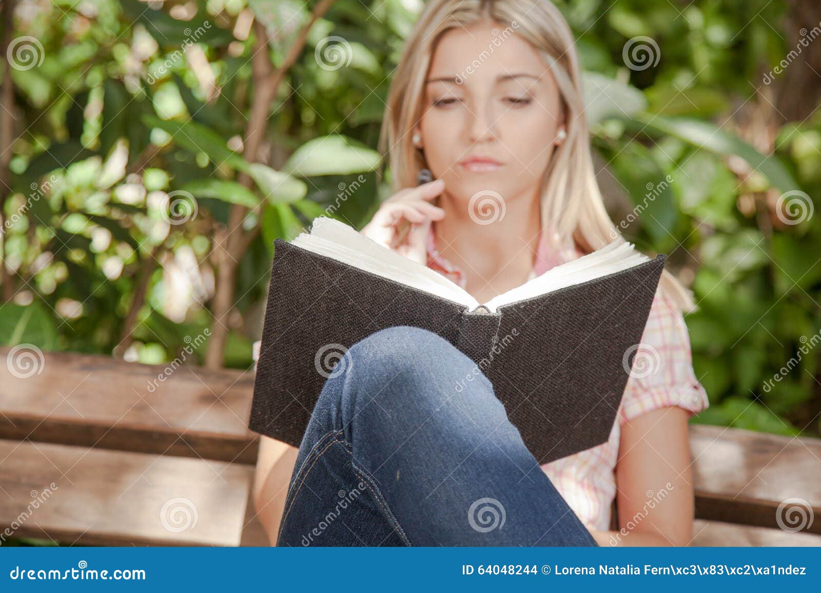 Pretty Woman Reading a Book in the Park Stock Photo - Image of reading ...